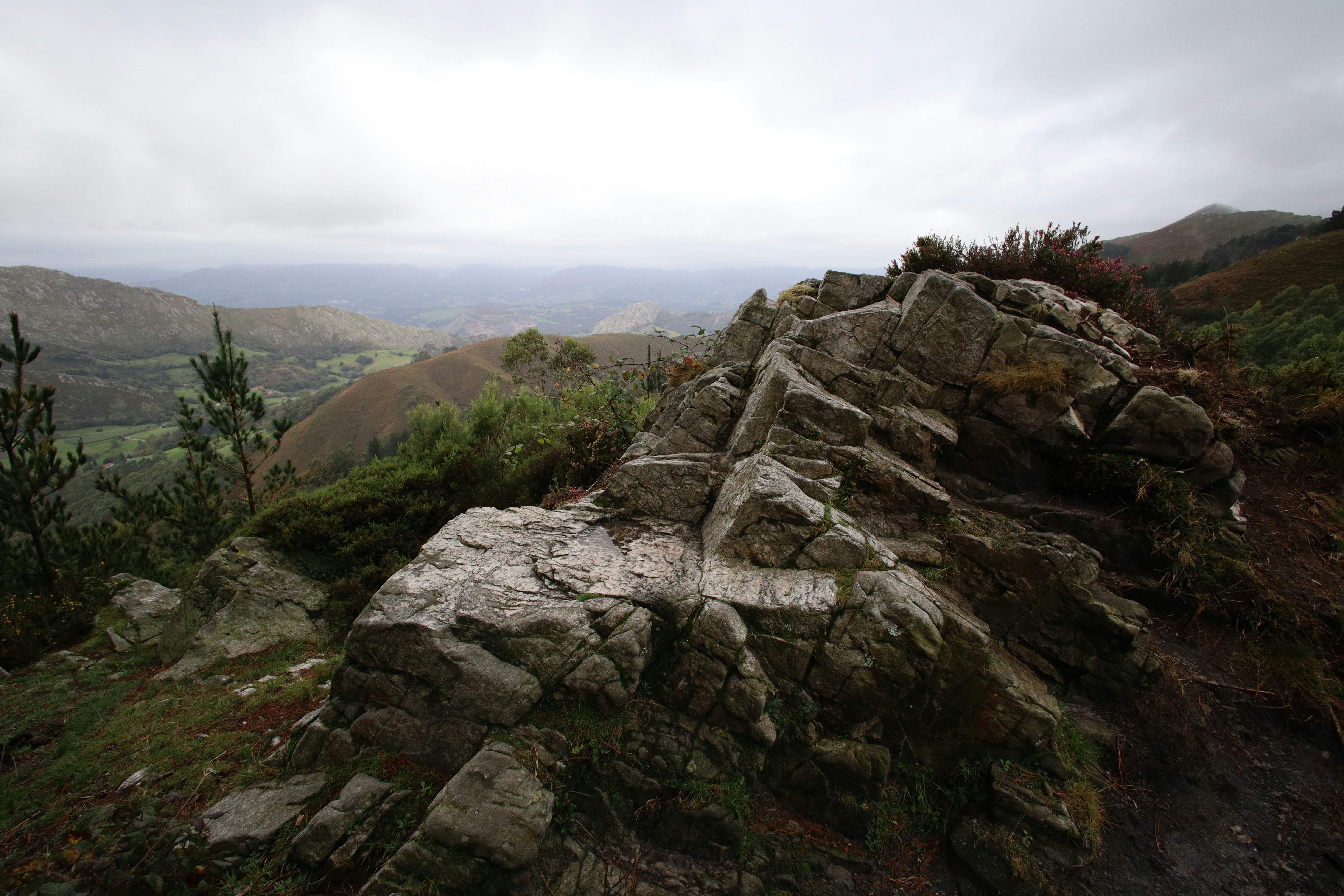 A rocky hillside with trees photo – Free Spain Image on Unsplash