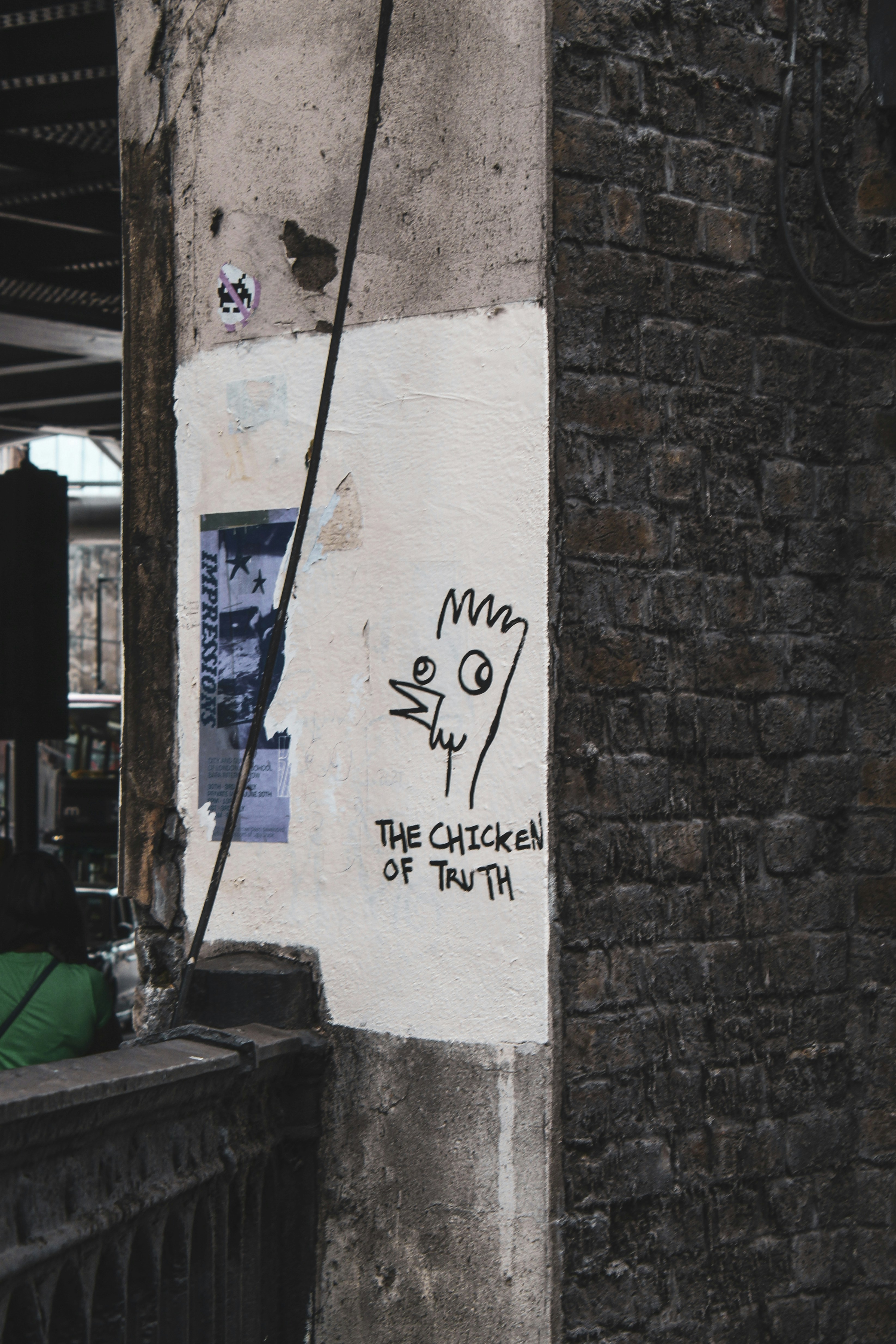 Graffiti Portrait: The Chicken of Truth on a Weathered Wall