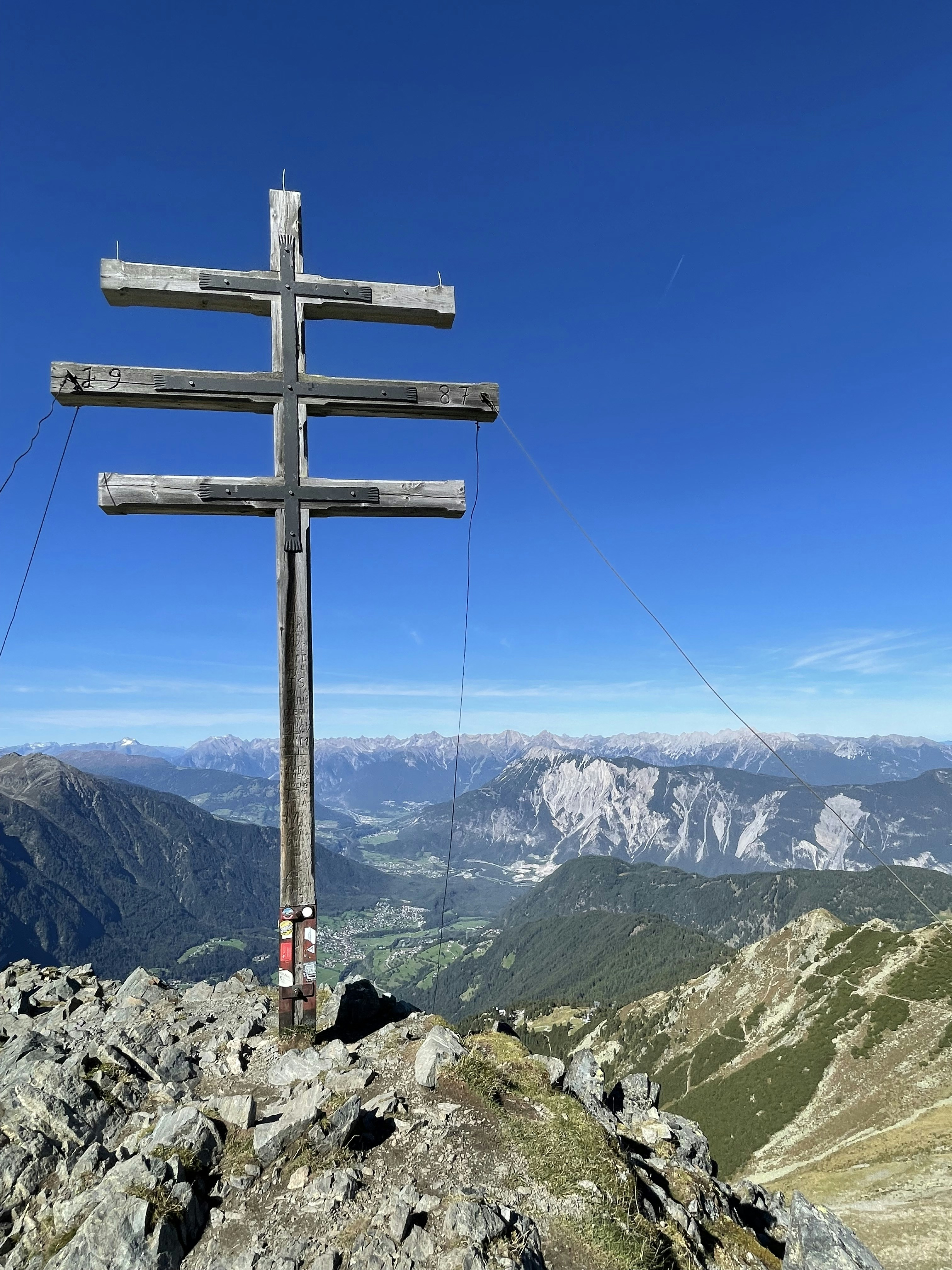 A wooden structure on a mountain photo – Free Wetterkreuz Image on Unsplash