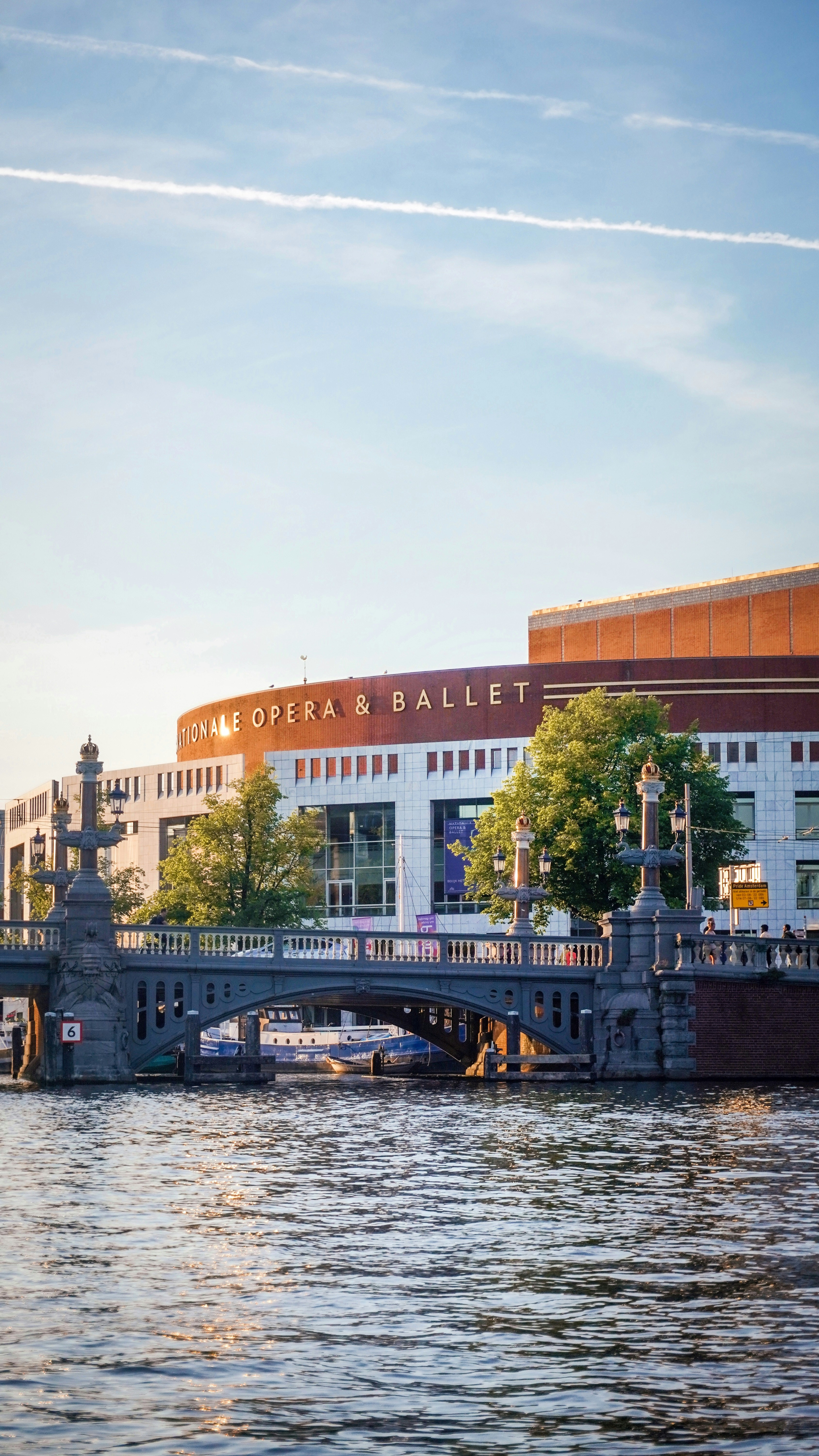 City Opera on the River: Arched Bridge and Modern Theater