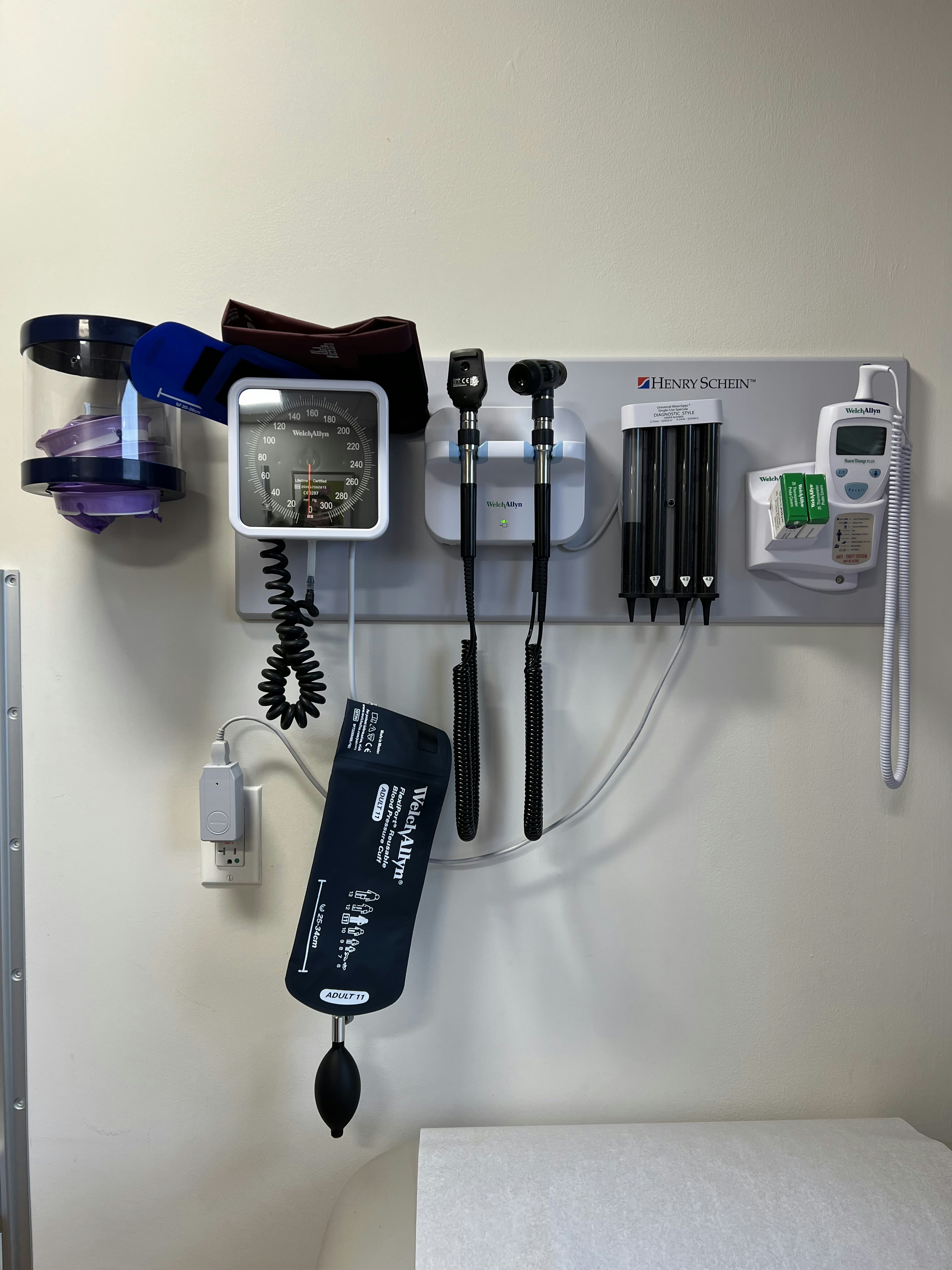 A wall with a wall of electronic devices and a phone on it photo – Free ...