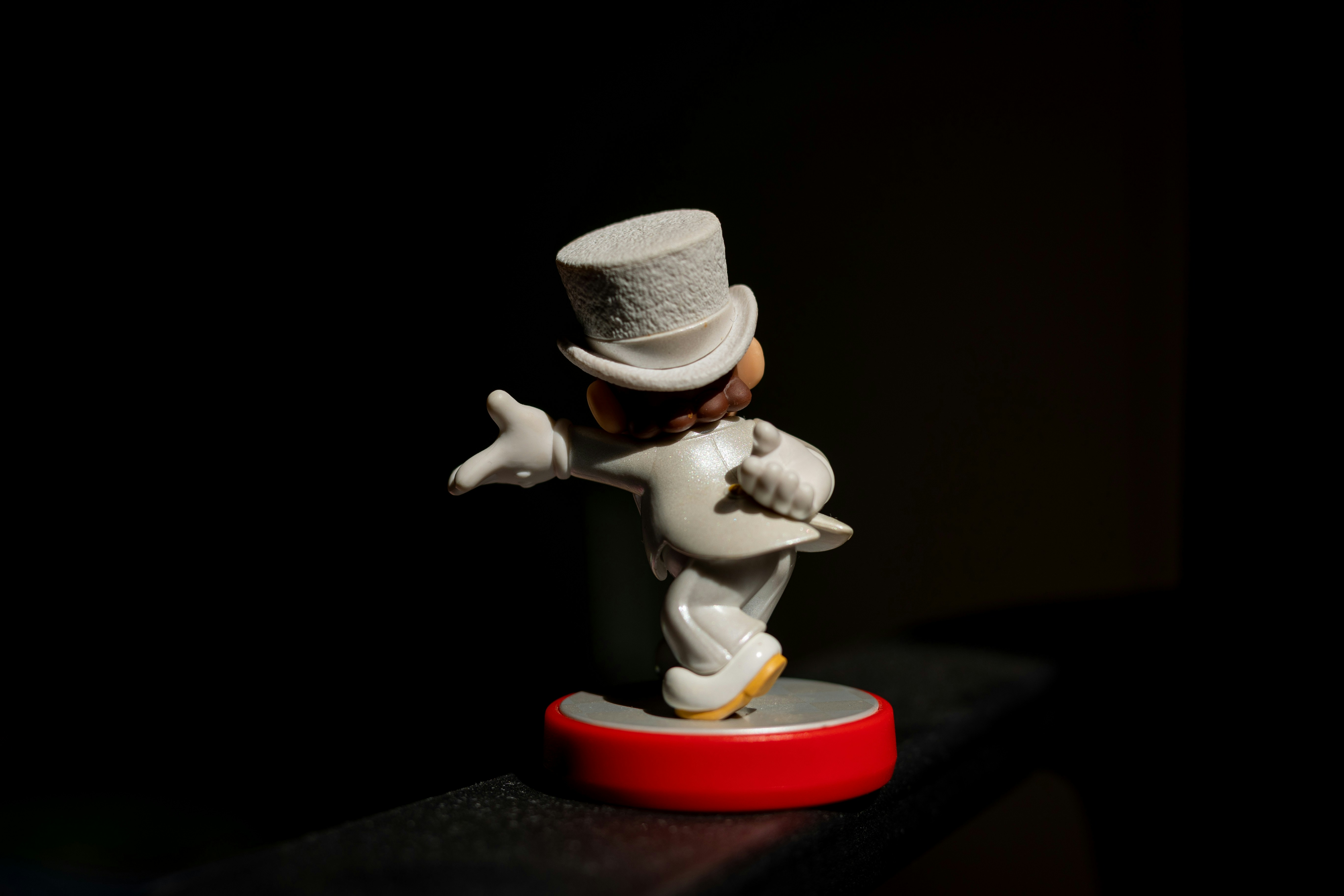 Shadowed Maestro: A Tiny Tin Man Takes the Spotlight