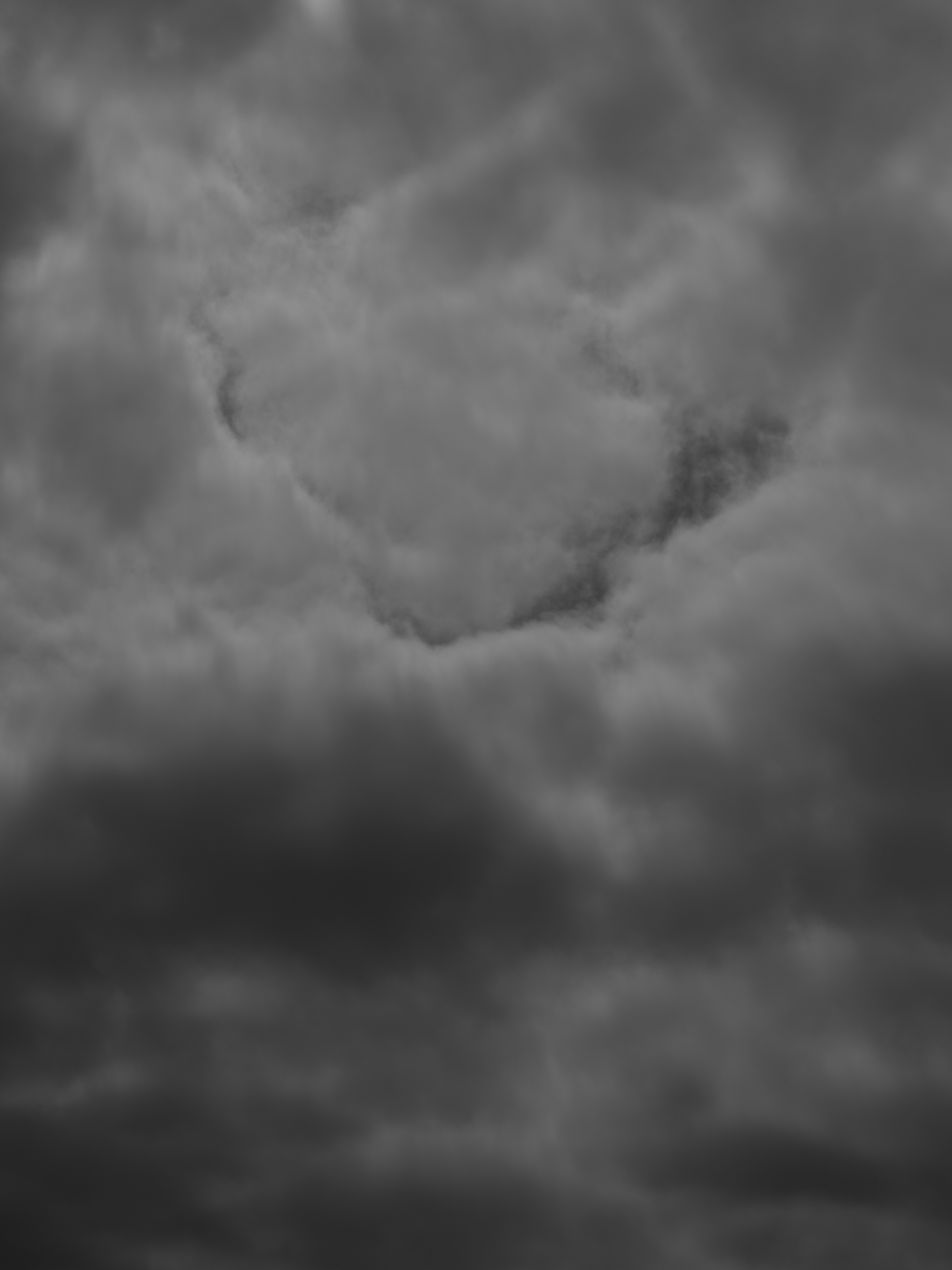 Halo in a Monochrome Sky: A Quiet Cloud Ring Emerges
