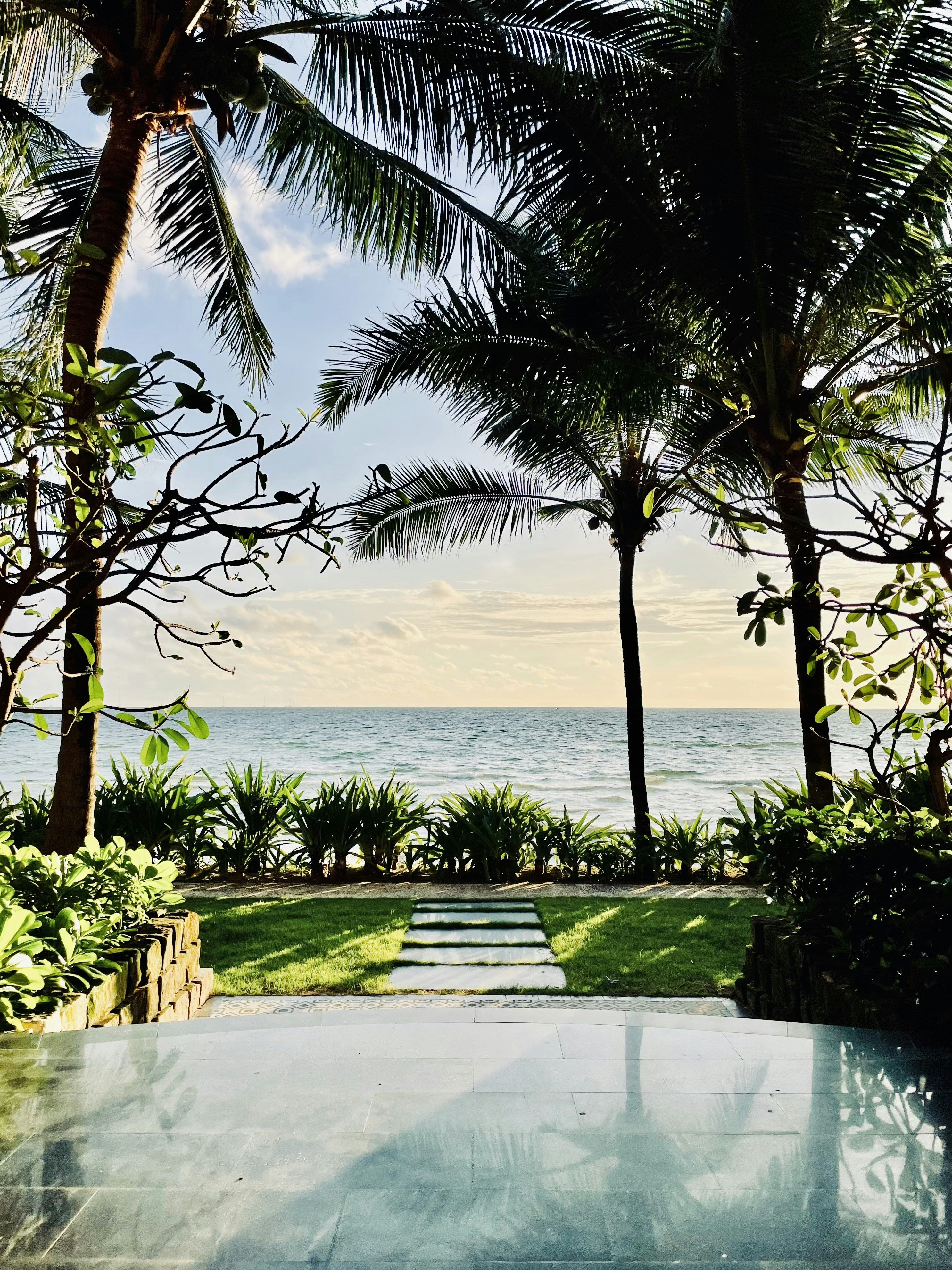 A pool with trees around it photo – Free Jw marriott phu quoc emerald ...