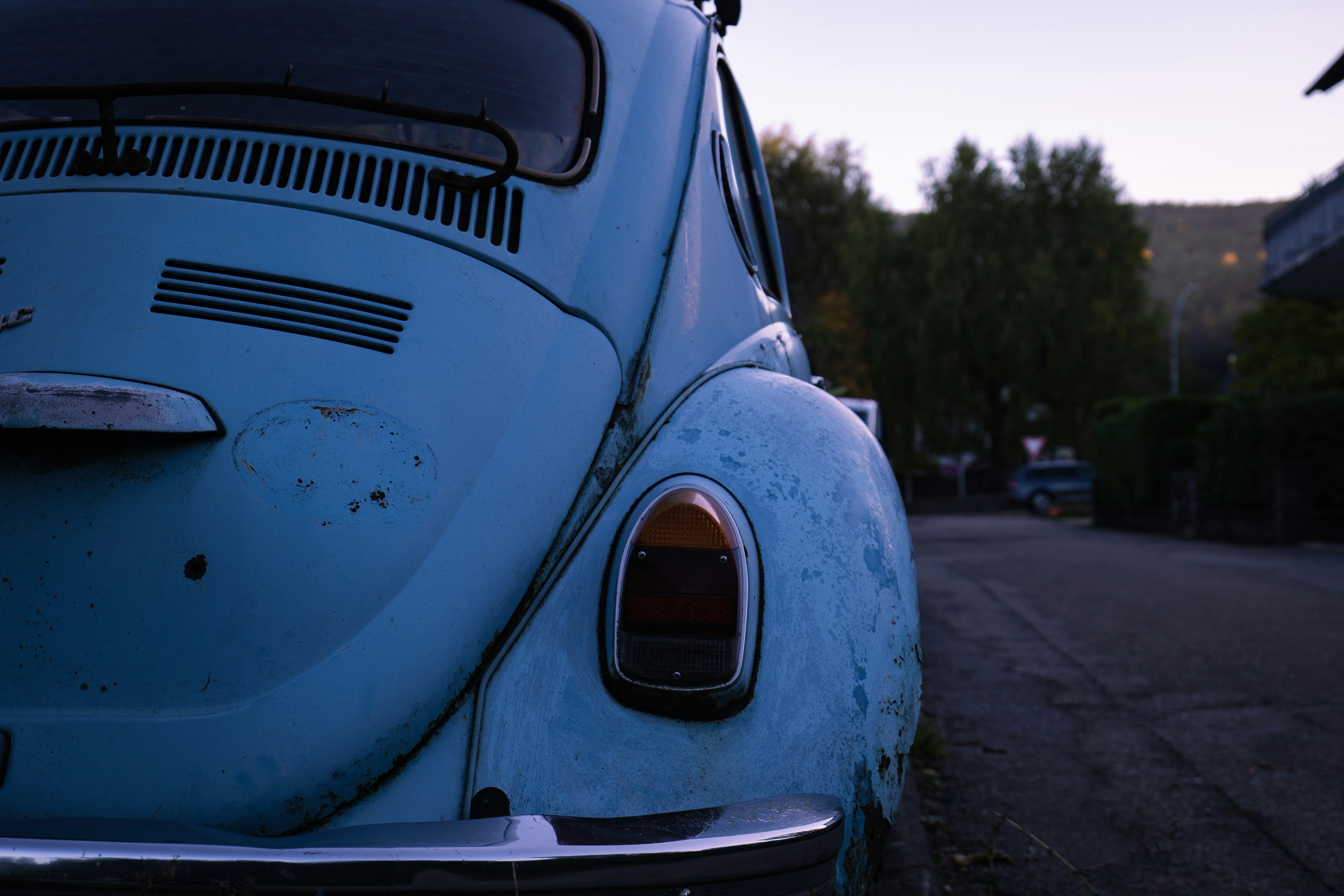 Pastel Blue Beetle at Dusk: A Quiet Roadside Reverie