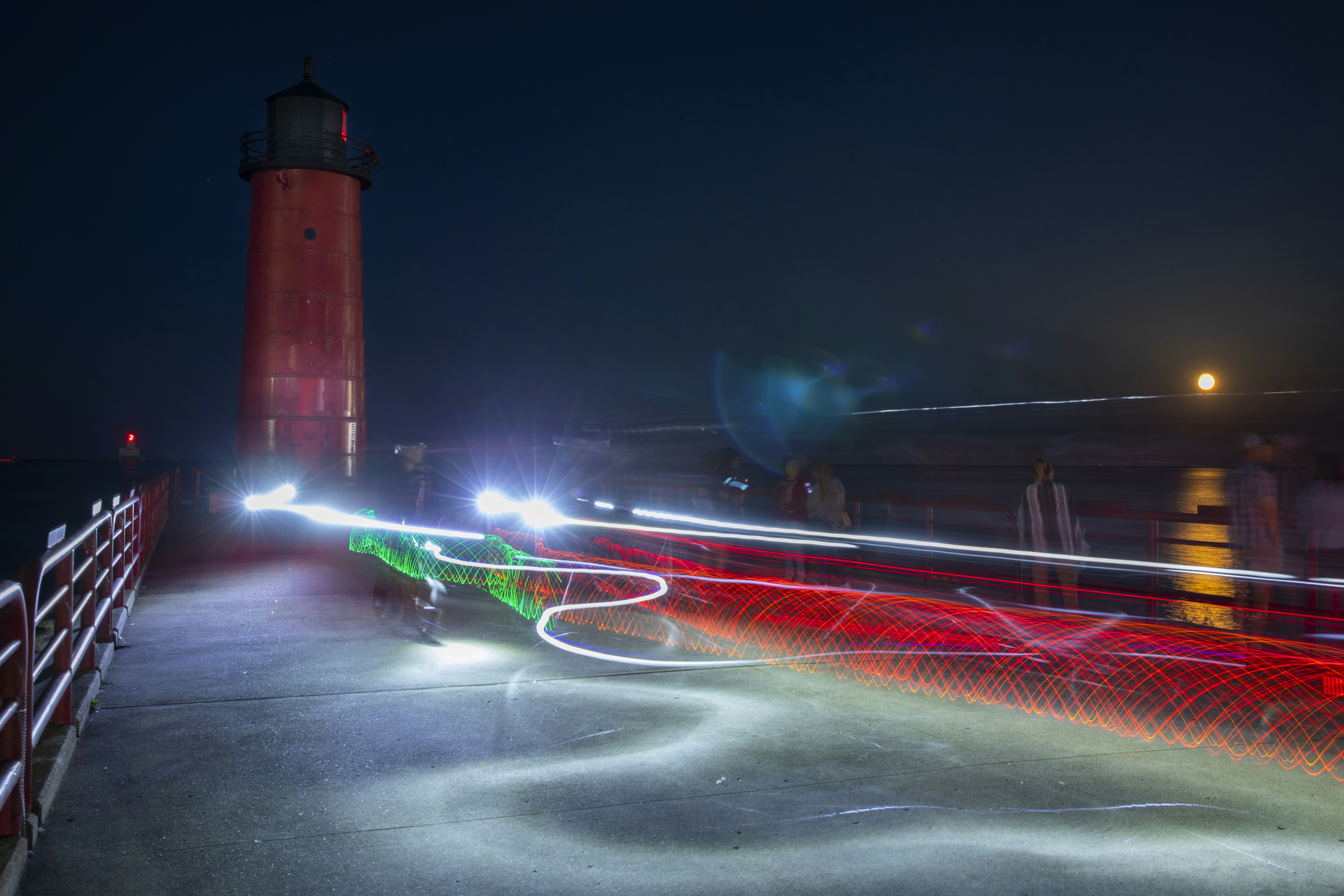A lighthouse at night photo – Free Milwaukee pierhead lighthouse Image ...