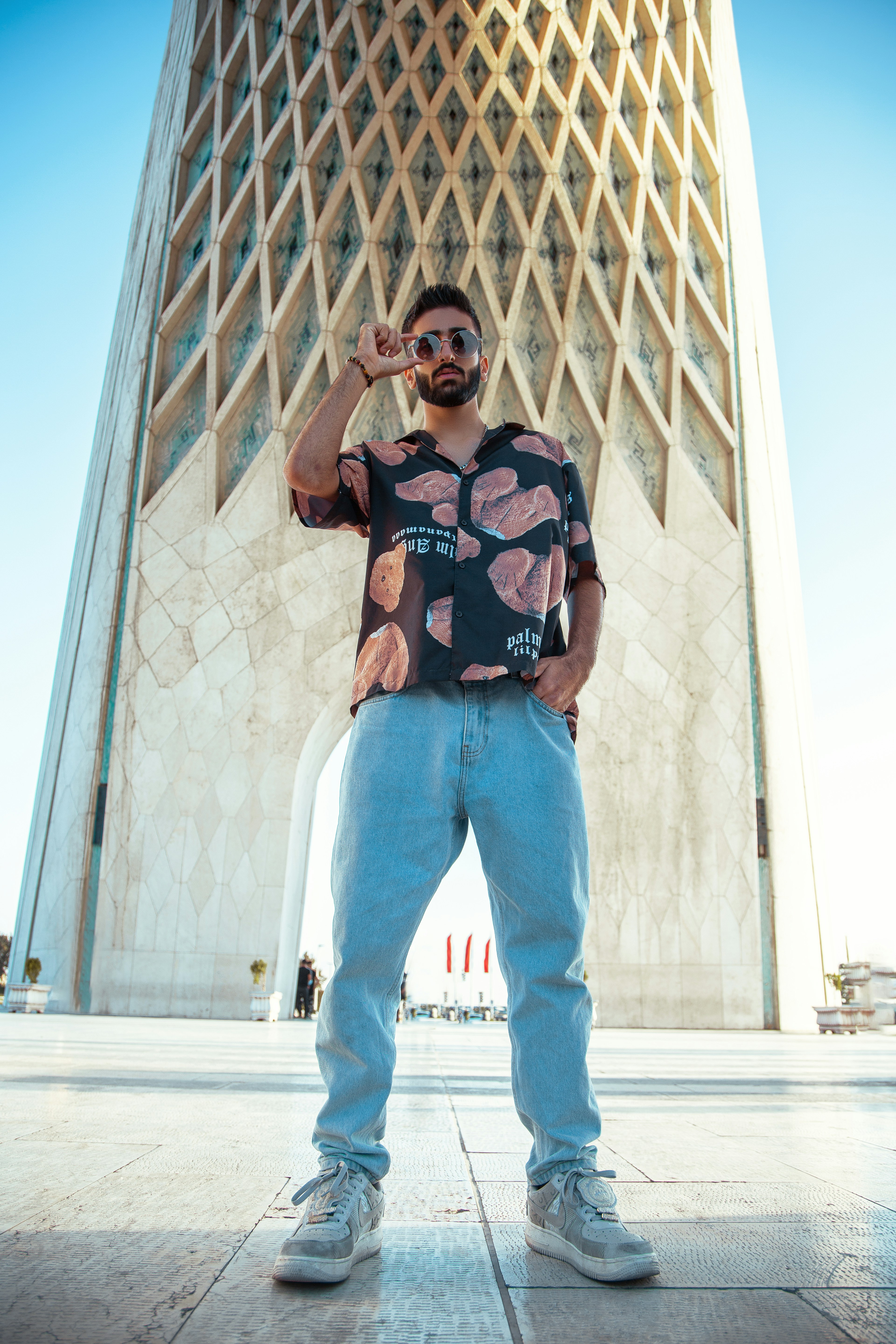 A person posing in front of a building photo – Free Tehran Image on ...