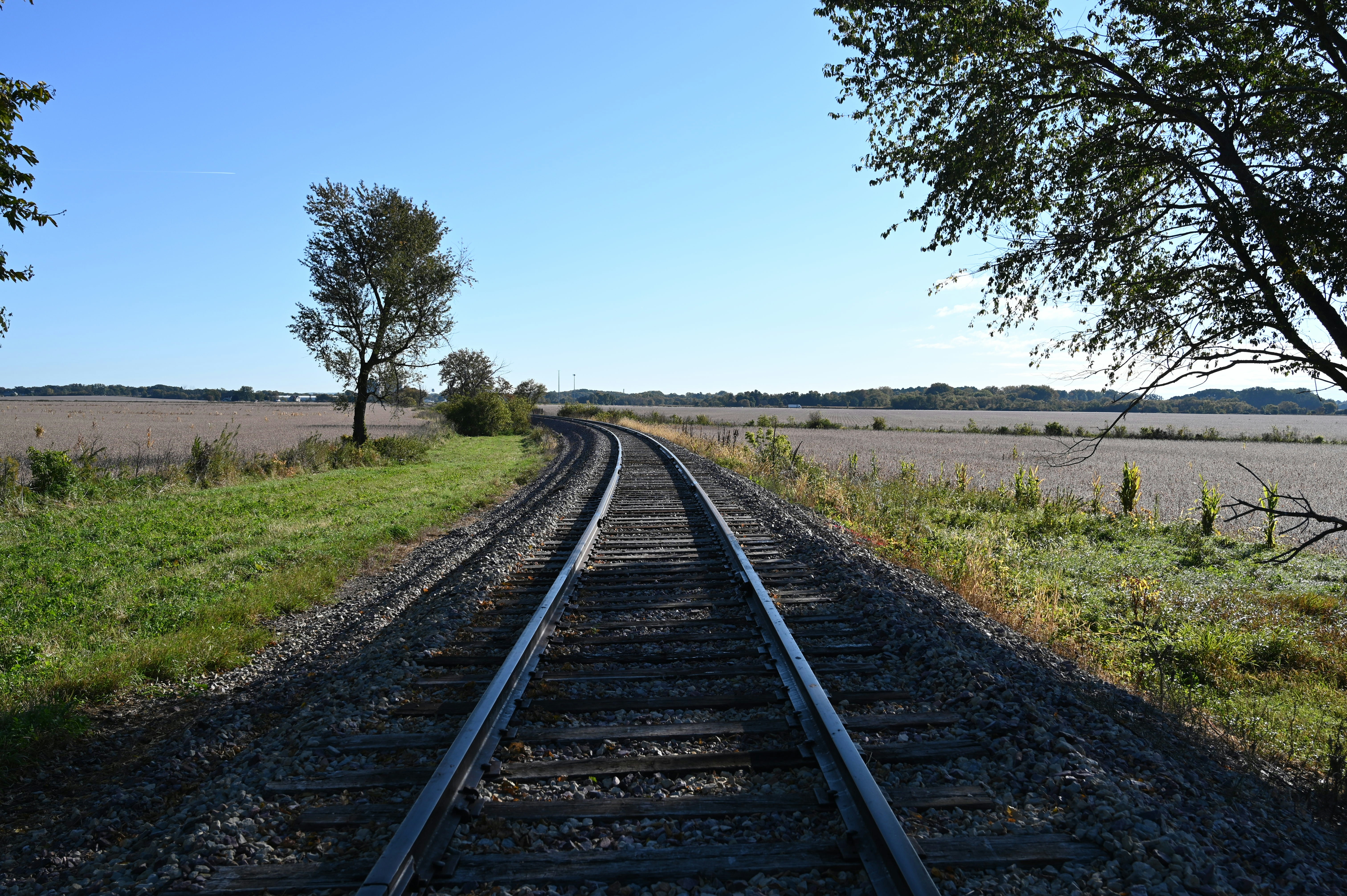 A railroad track in a field photo – Free Chemung Image on Unsplash