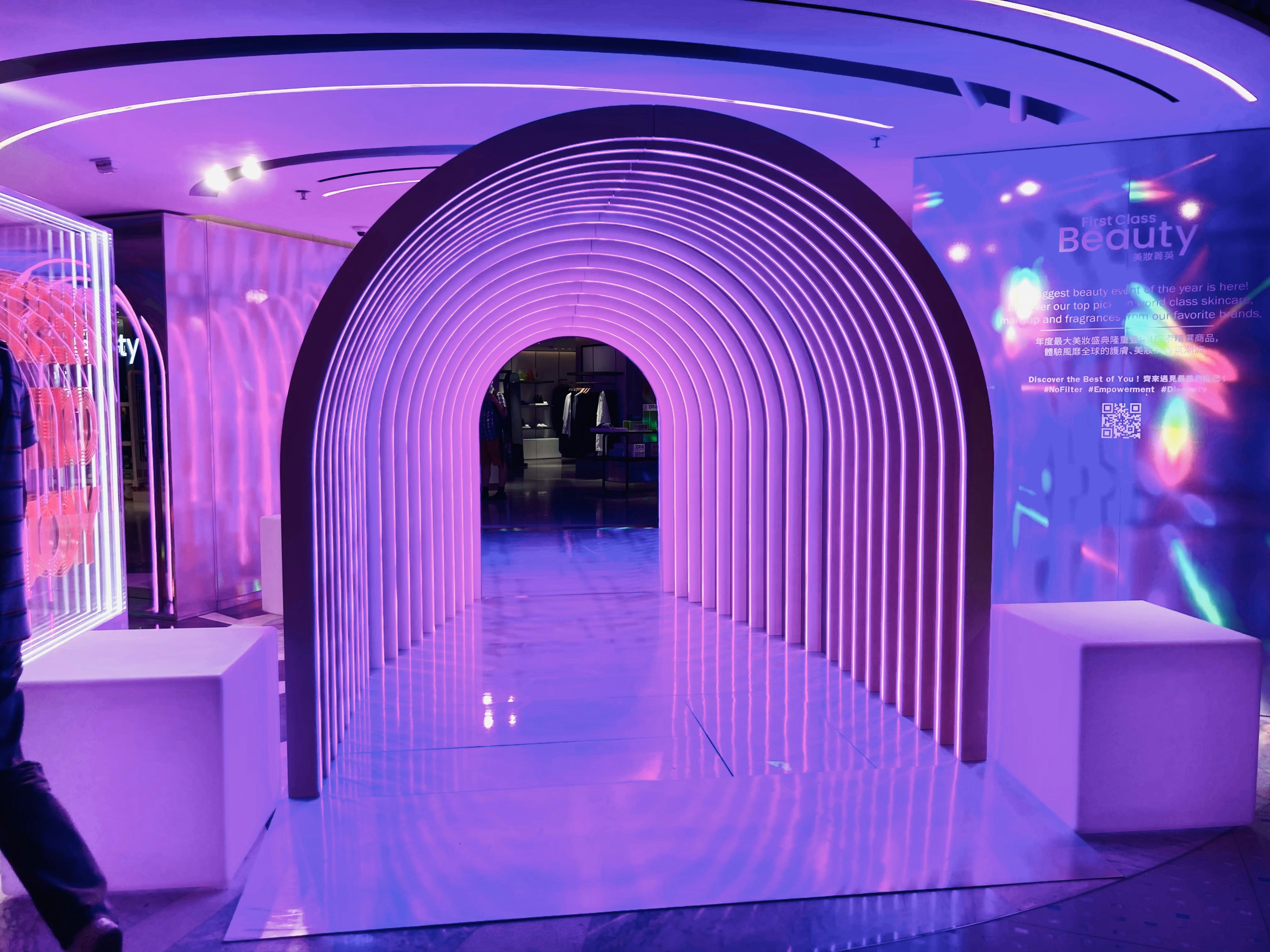 A purple portal without people of a corridor.
