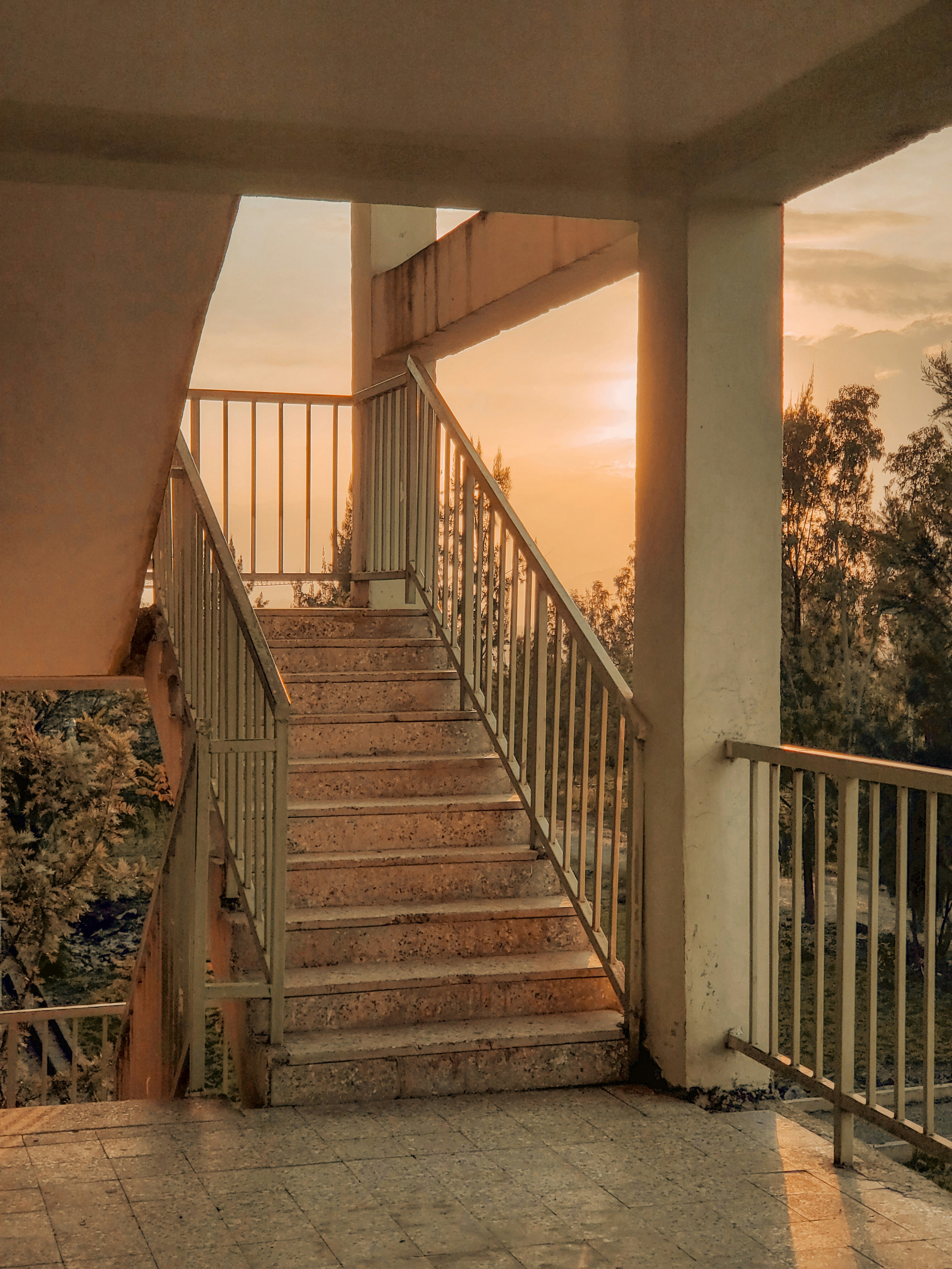 Sunset Staircase Veil: An Abandoned Terrace Framed by Warm Light