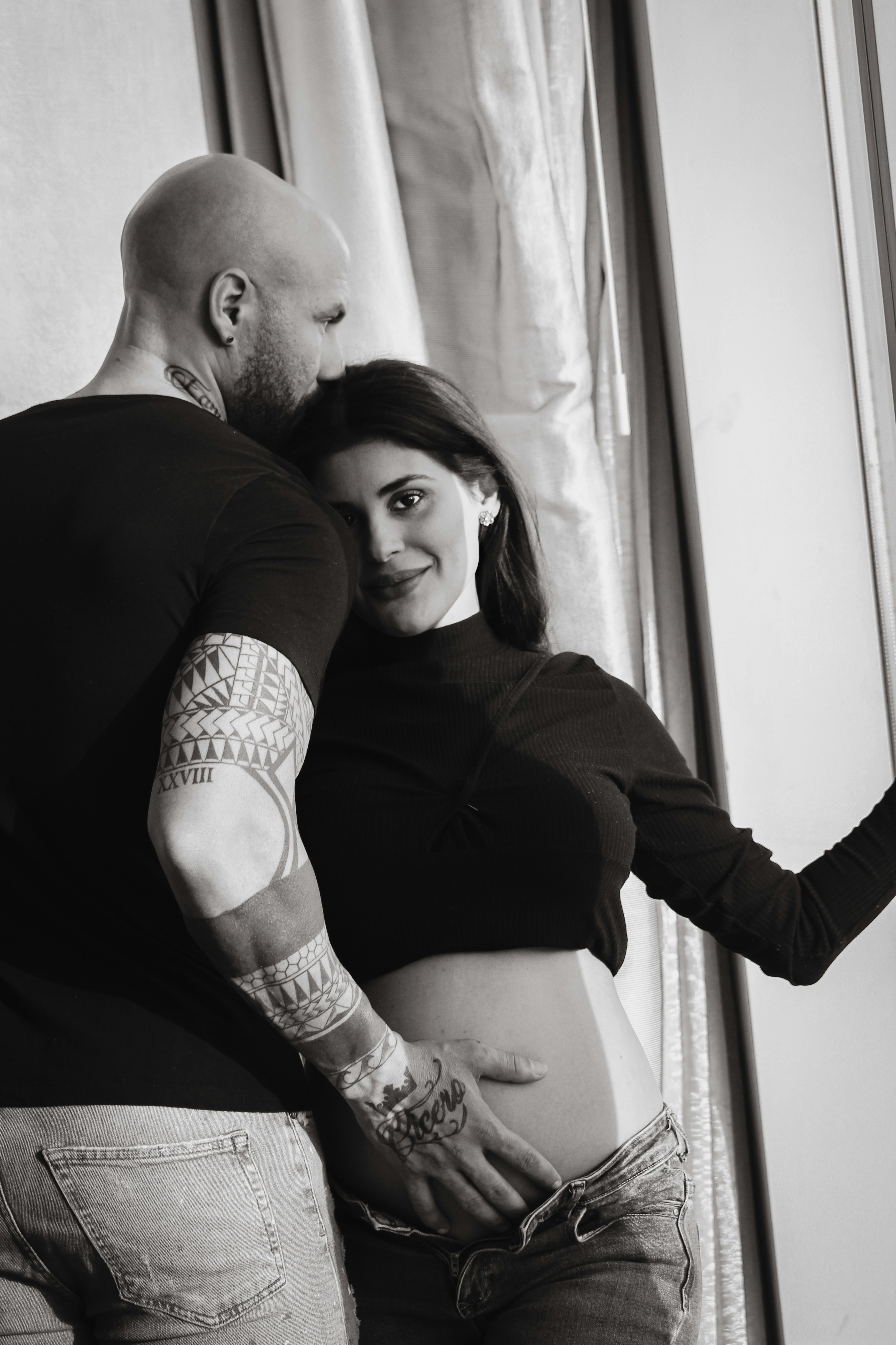 Curtain Light, Close Embrace: A Tender Moment of Expectation