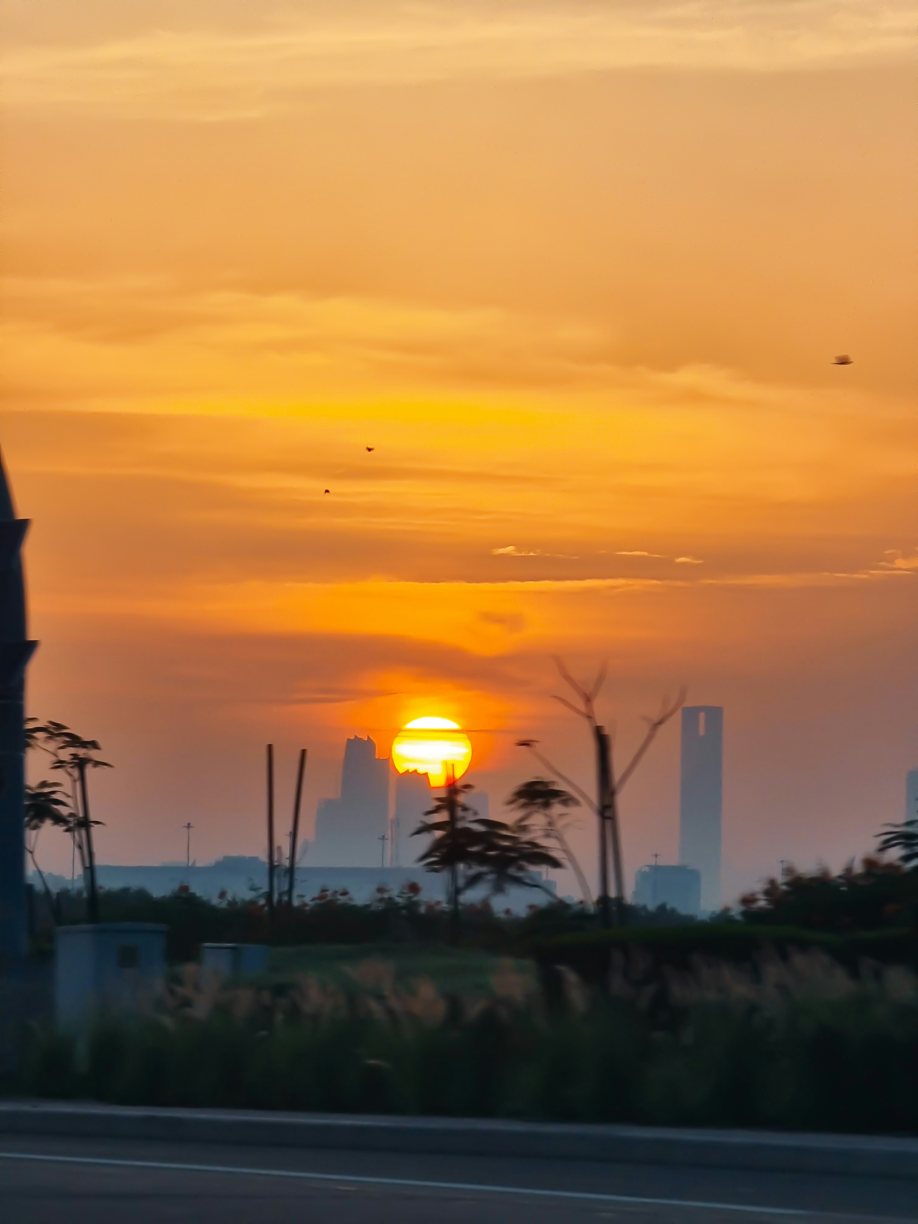 A sunset over a city photo – Free Abu dhabi - united arab emirates ...