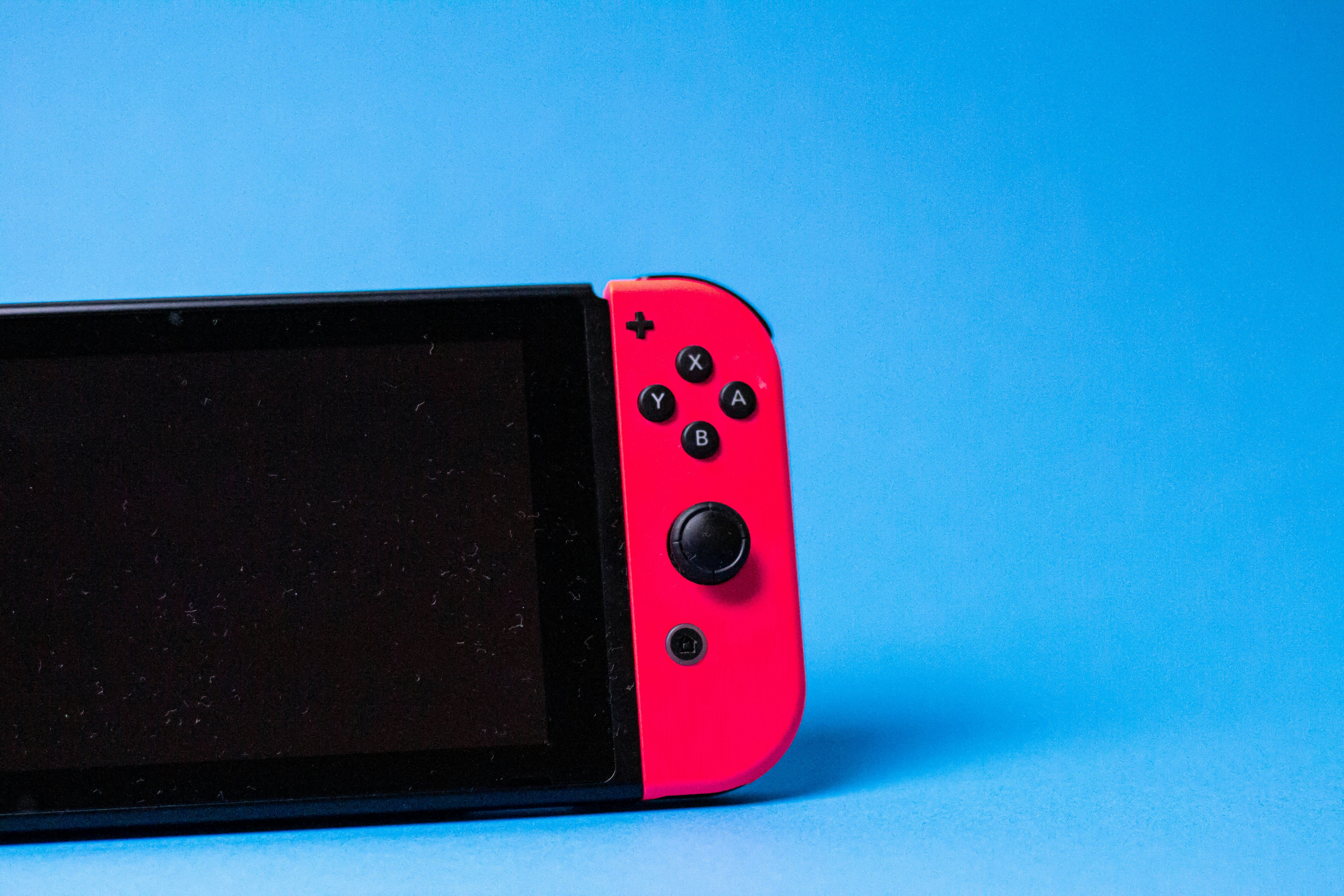 A couple of black rectangular devices photo – Free Nintendo switch ...