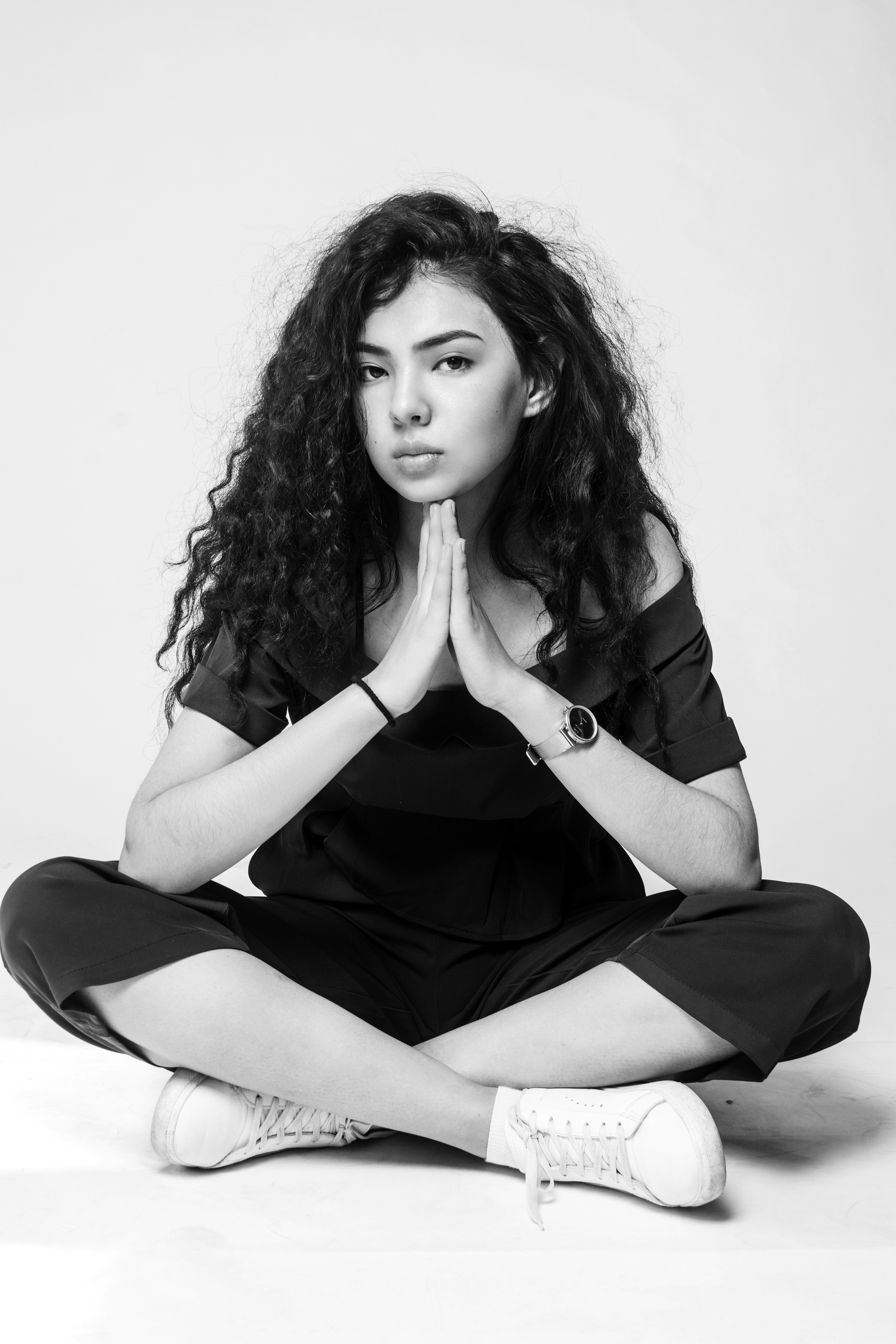 Center of Quietude: A Black-and-White Portrait of Contemplative Poise