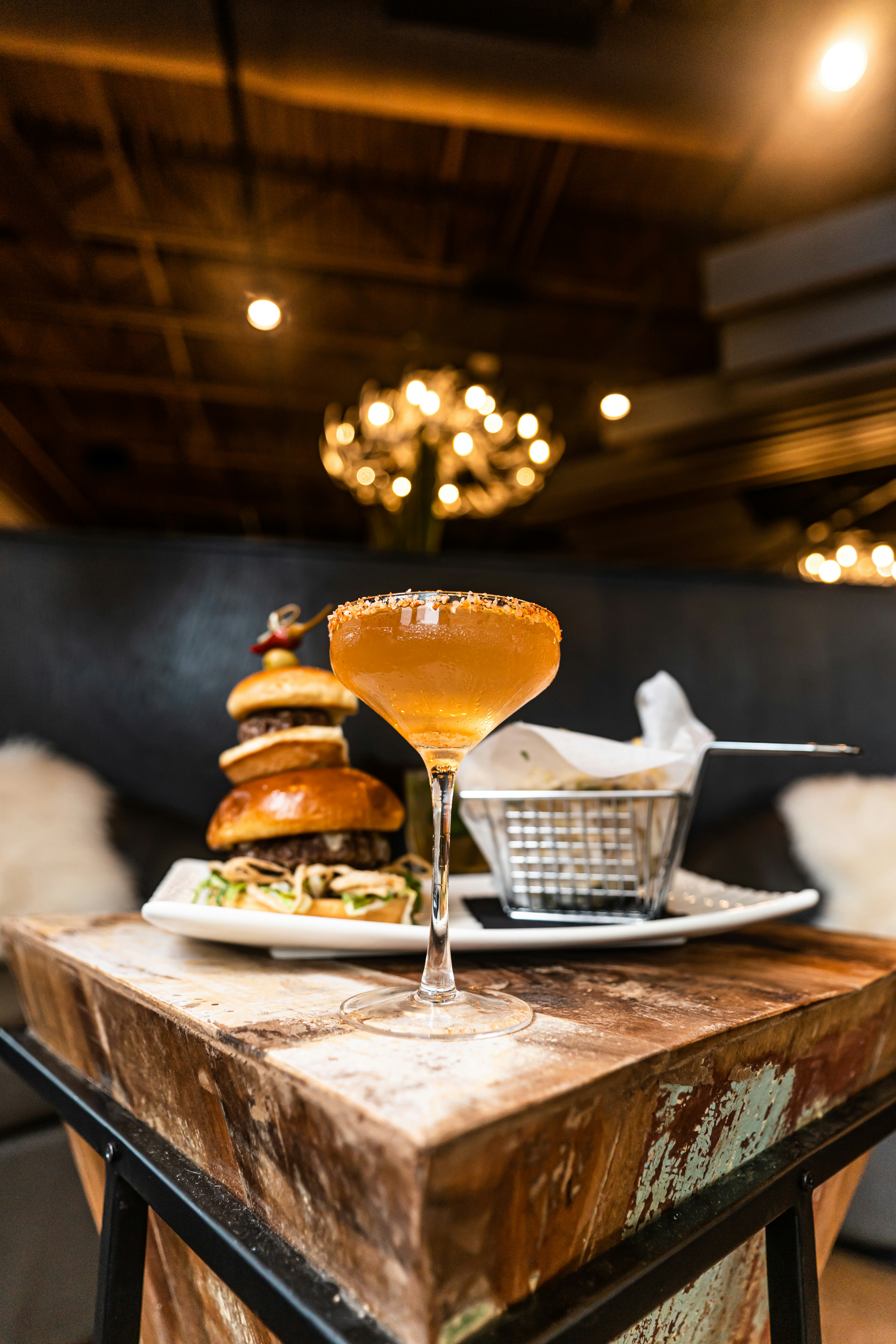 A Culinary Trio: Drink, Burger, and Fries Harmony