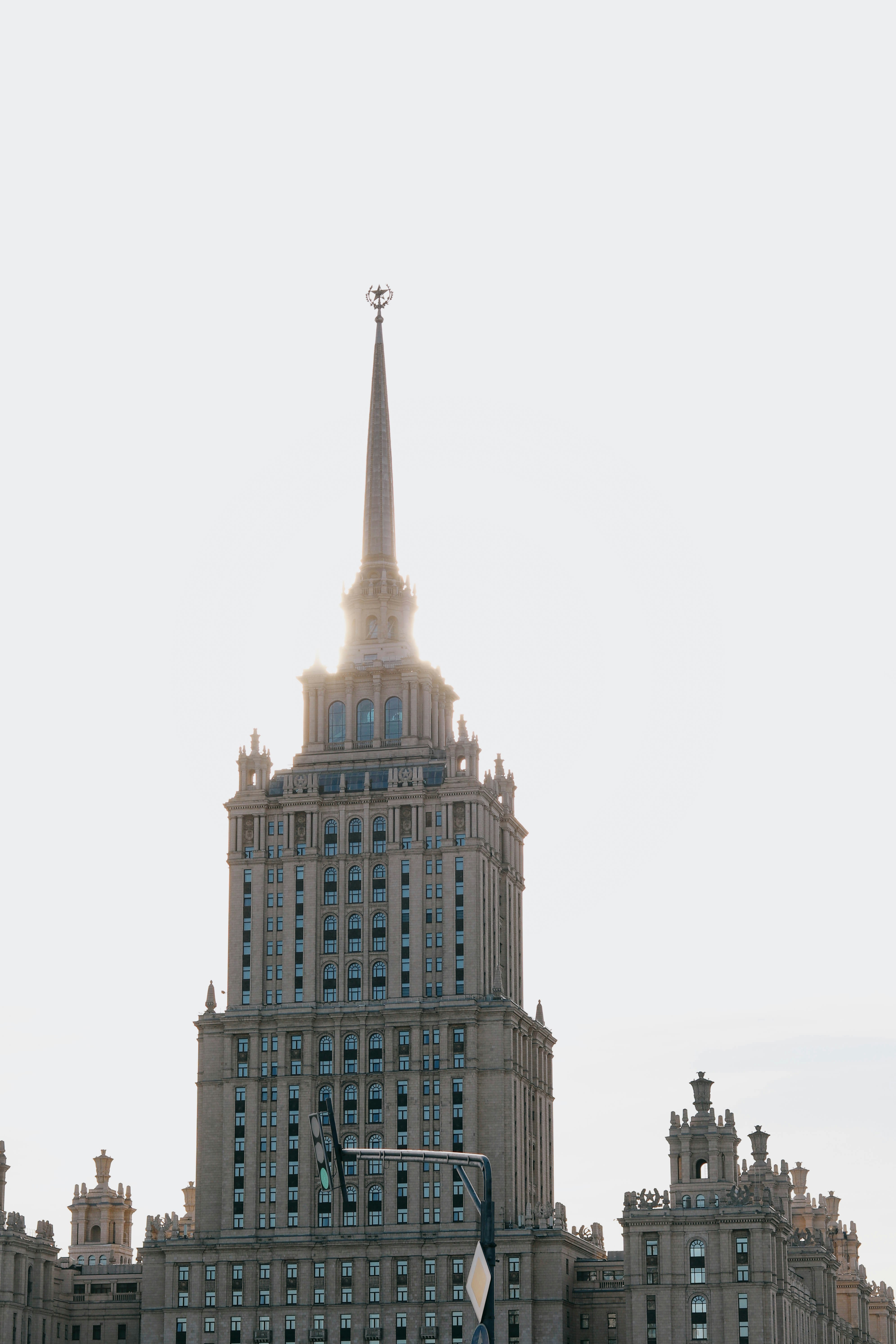 A tall building with a cross on top photo – Free Architecture Image on ...