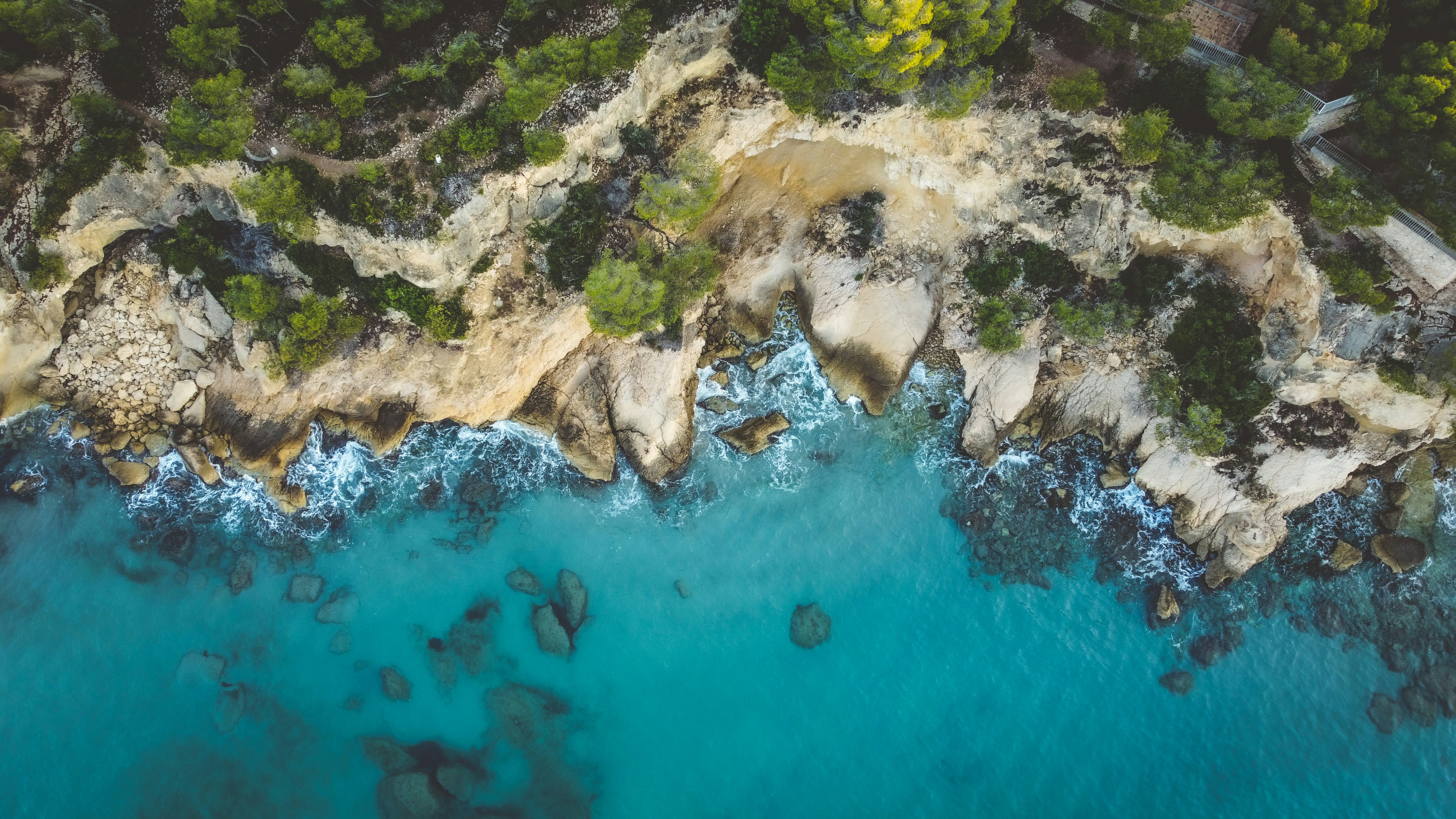 A view of a large island with many small islands photo – Free Wallpaper ...