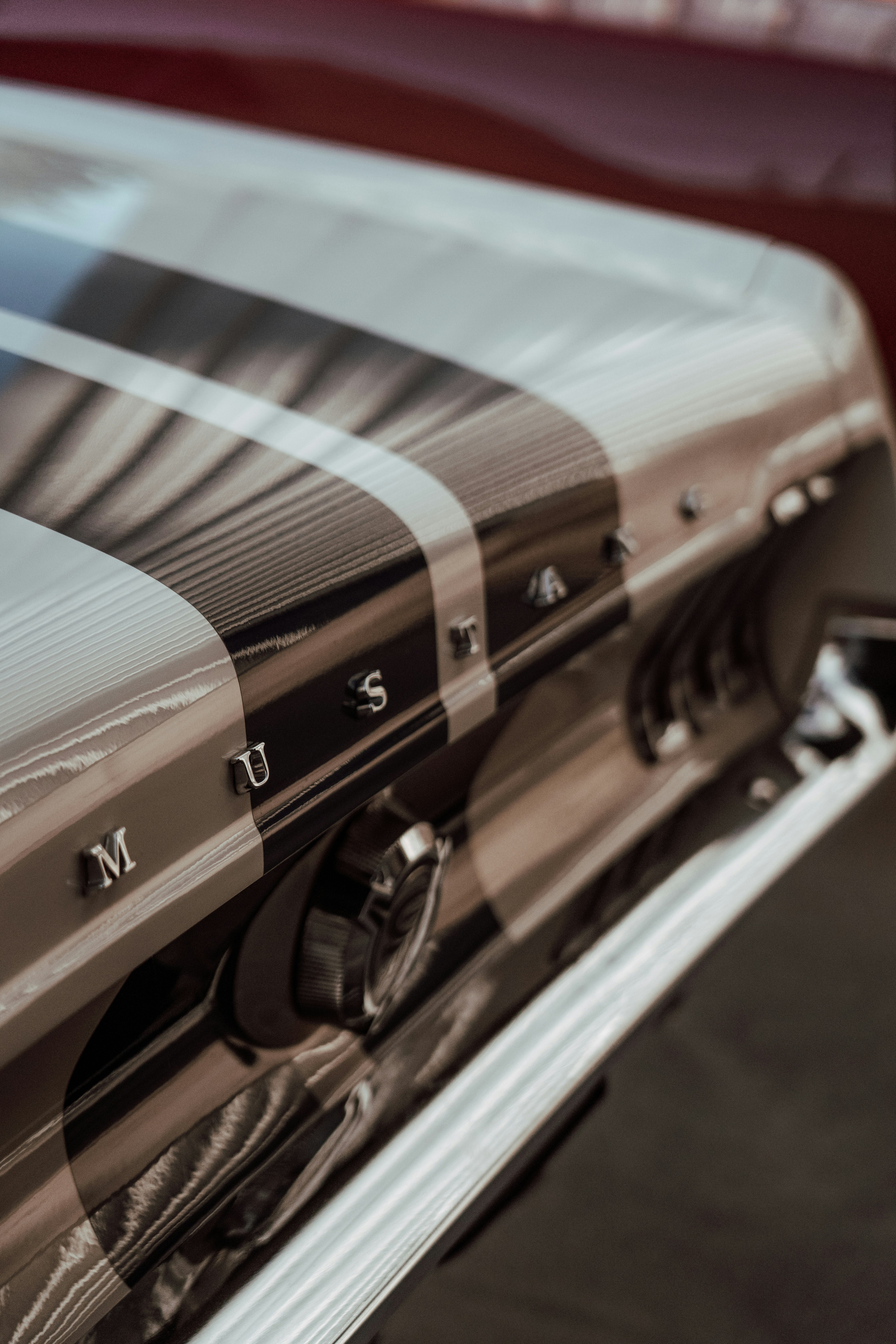 Chrome Stripes and Badges: A Vintage Mustang in Gentle Blur