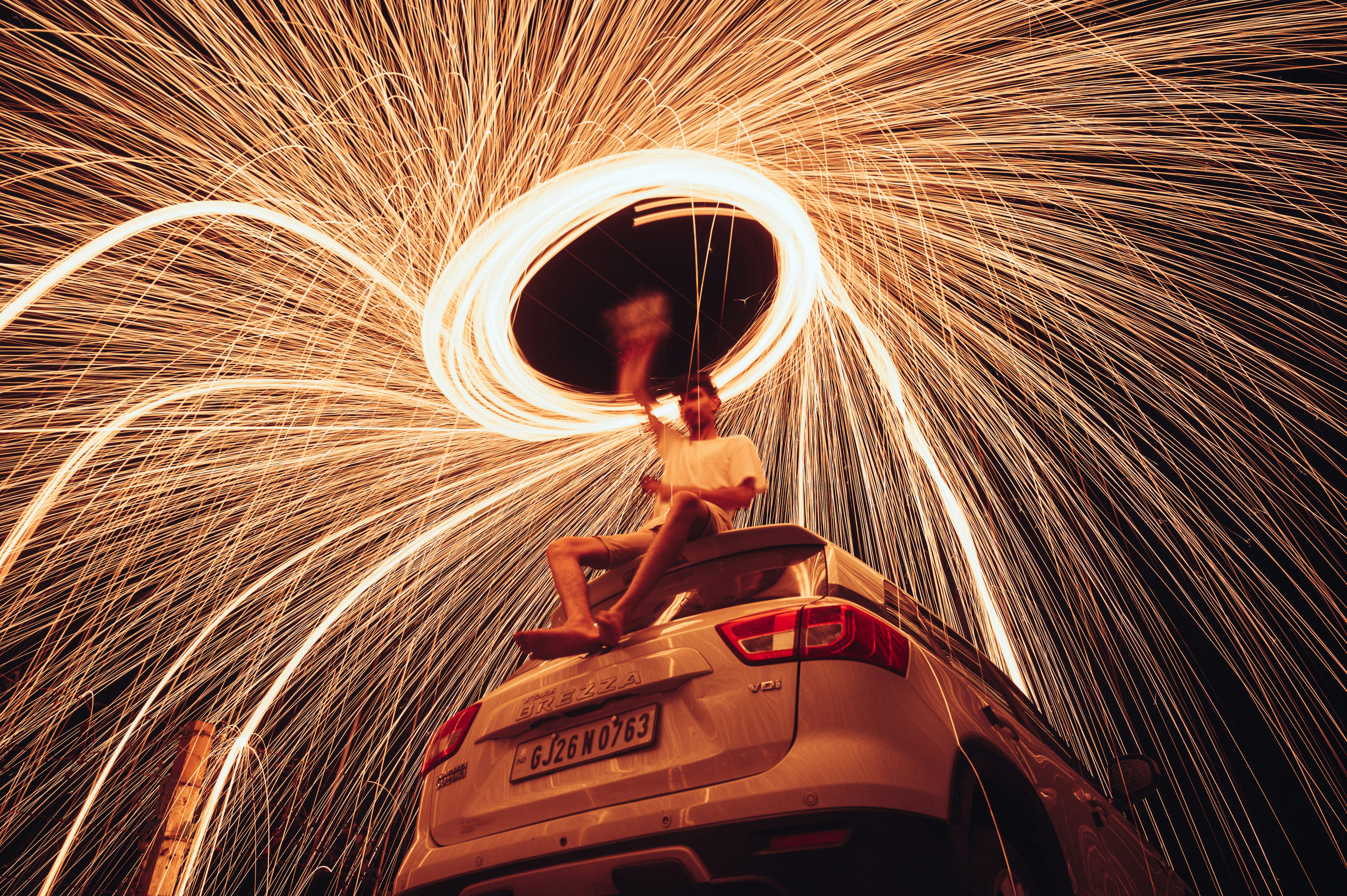 Spinning Sparks over the Car Roof: Night Skywork with Steel Wool