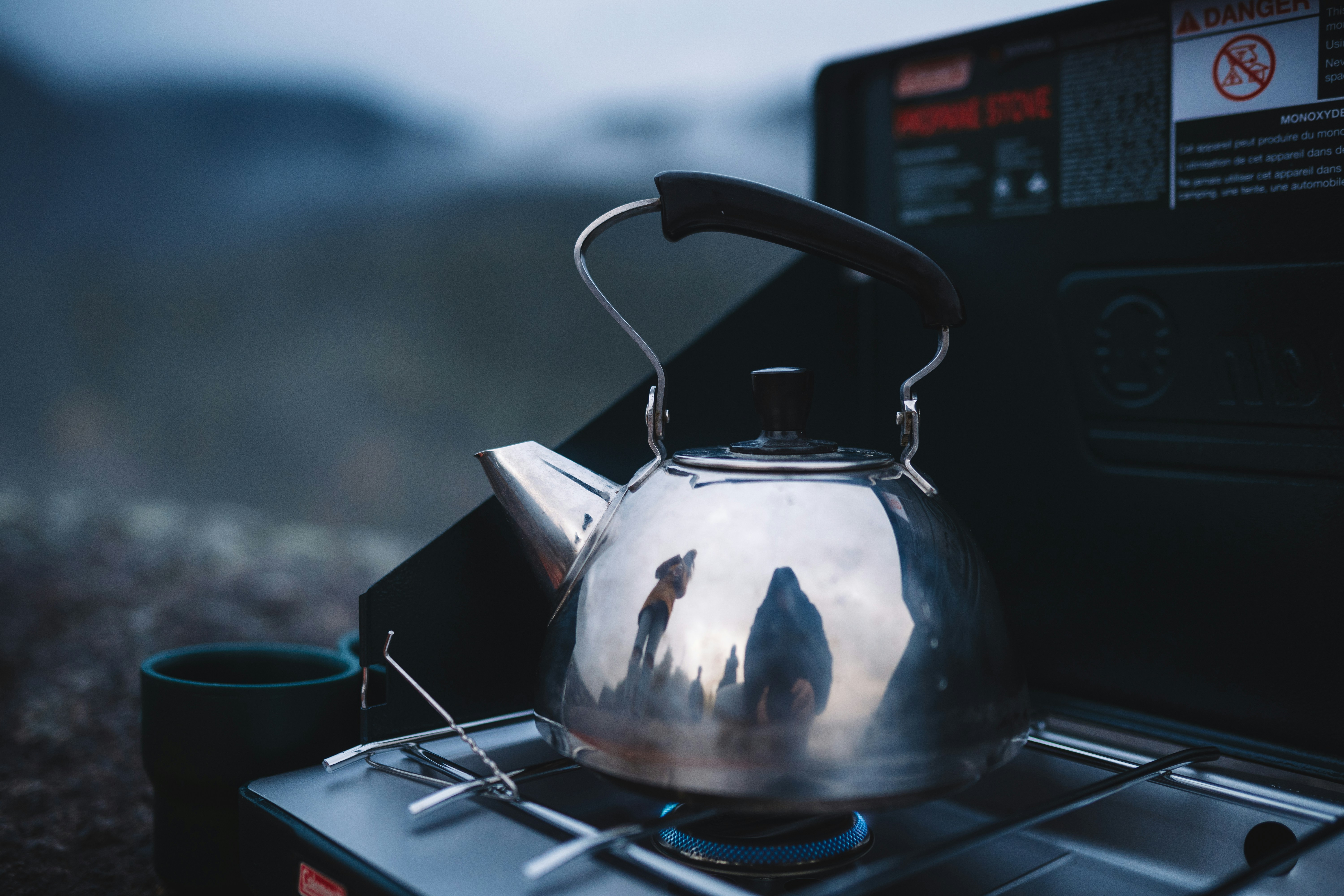 a tea kettle on a stove