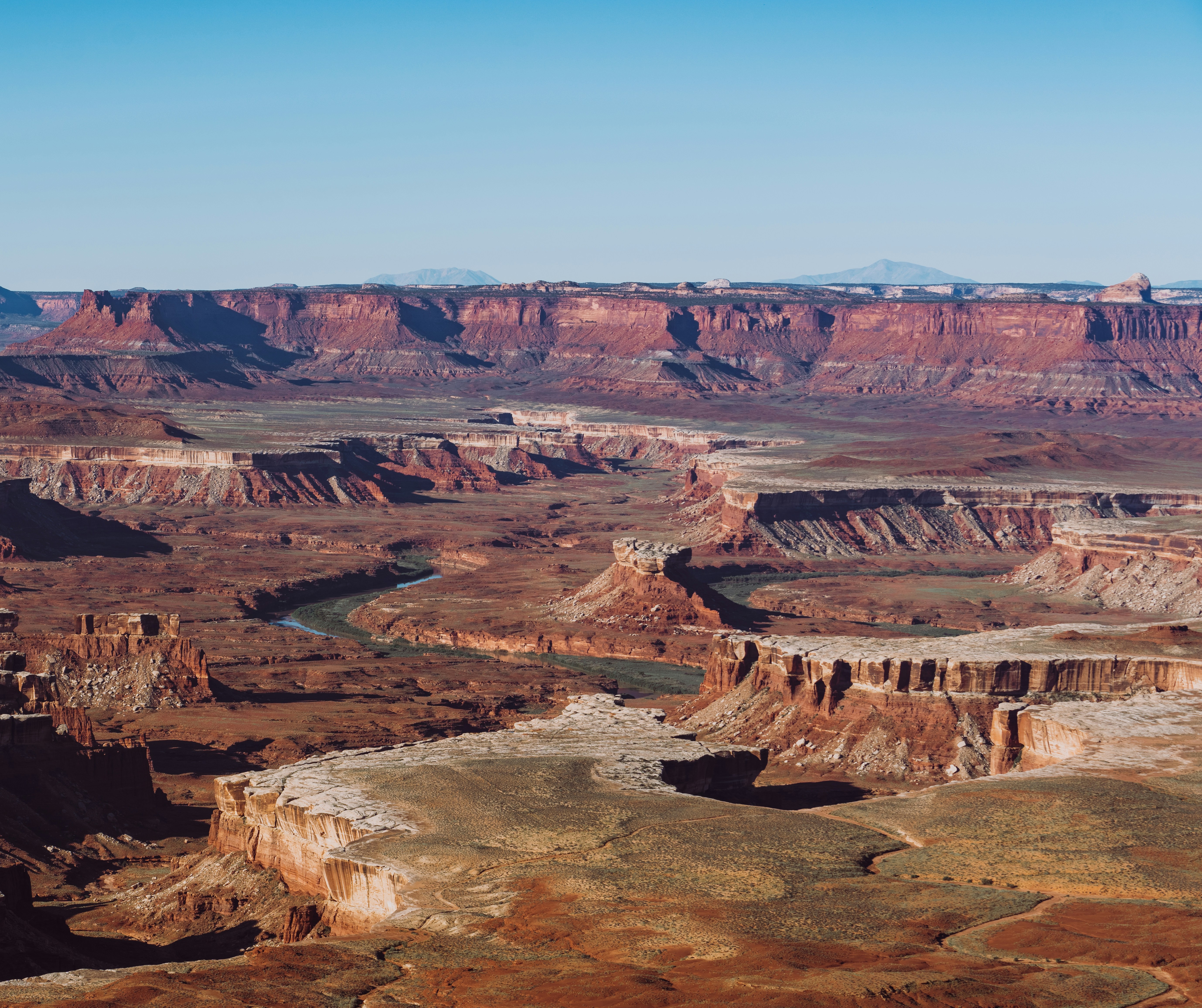 A large canyon with a few buildings photo – Free Canyonlands national ...