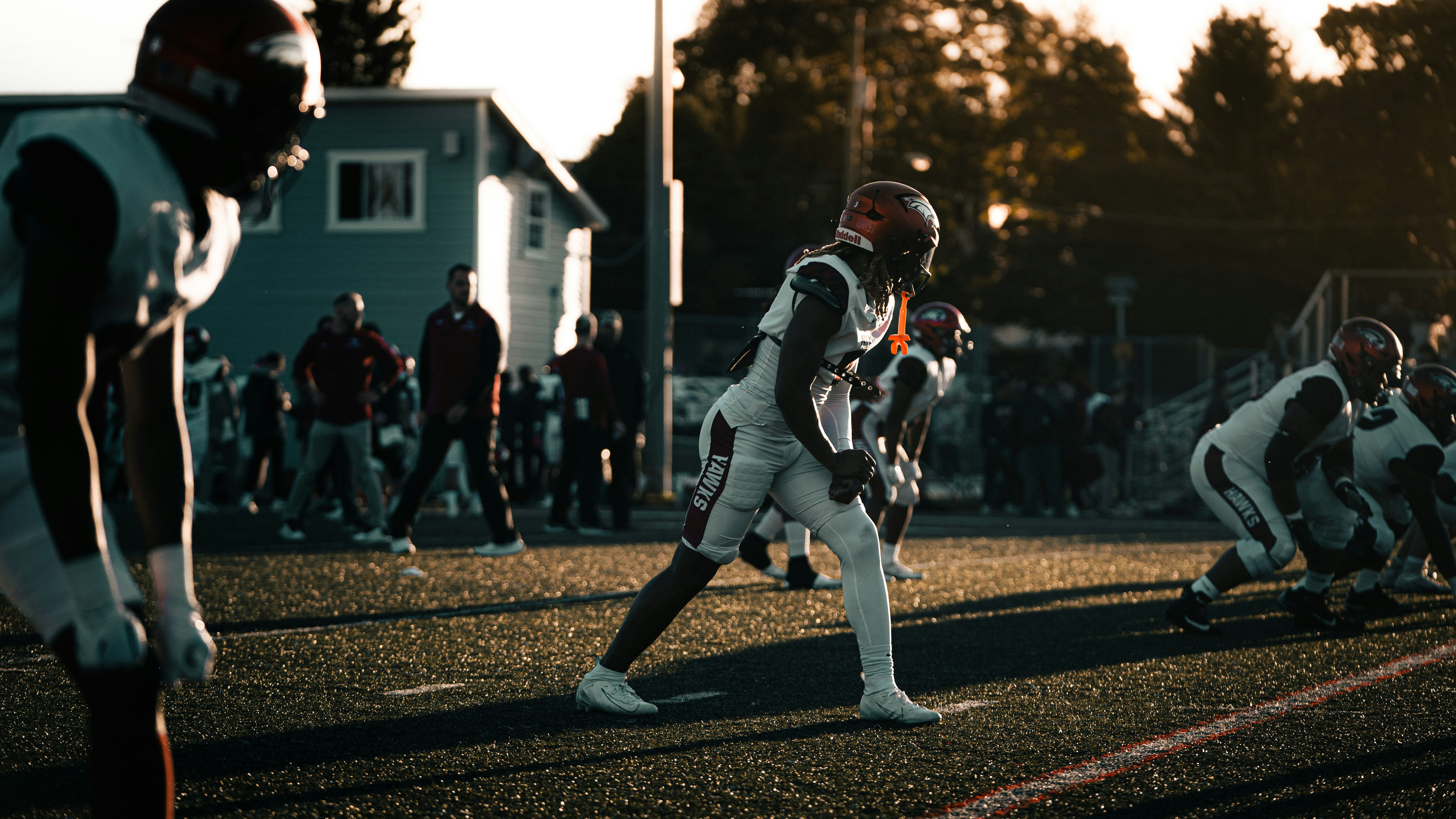 A group of people playing football photo – Free Highschool football ...