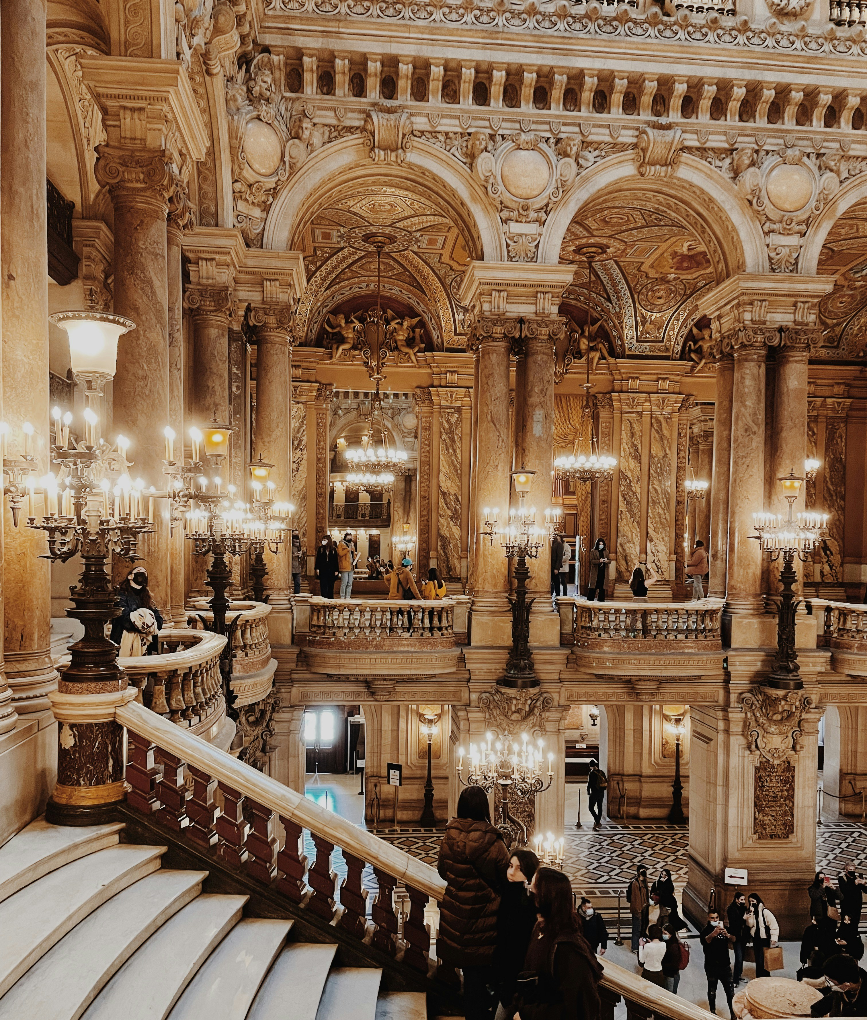 A large ornate building with people in it photo – Free Paris Image on ...