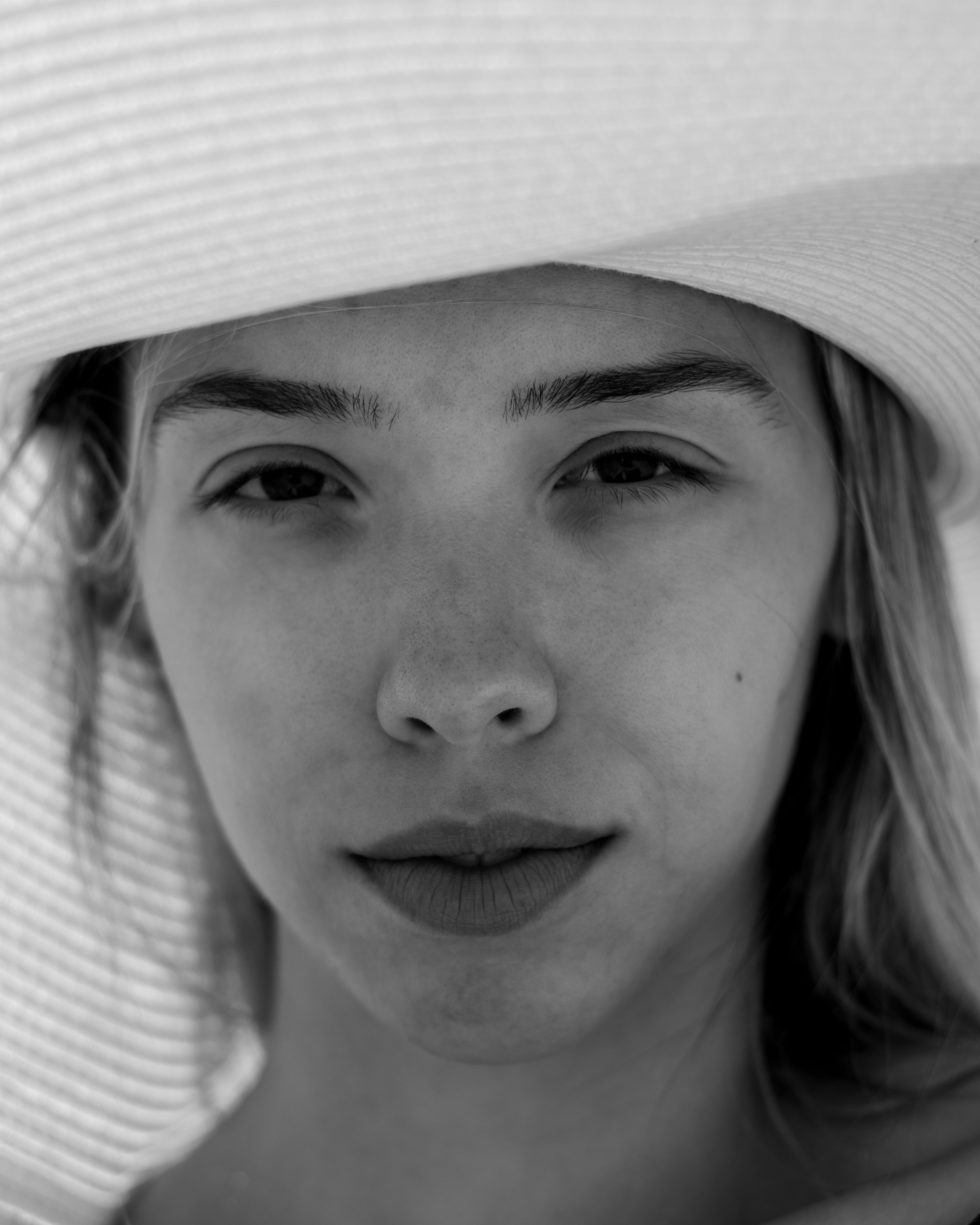 Quiet Confidence beneath the Wide-Brim Shadow