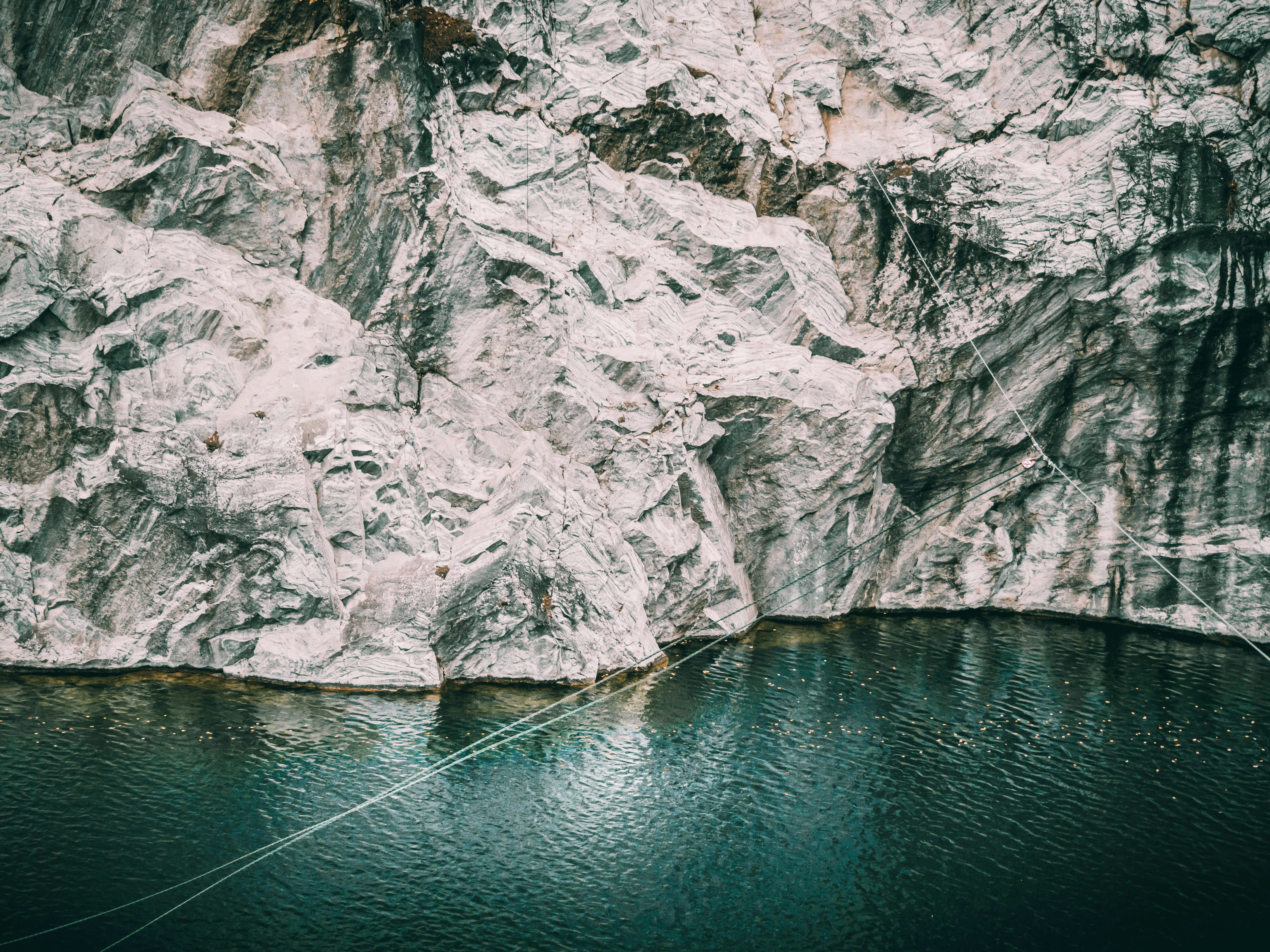 Turquoise Stillness Beneath Weathered Granite