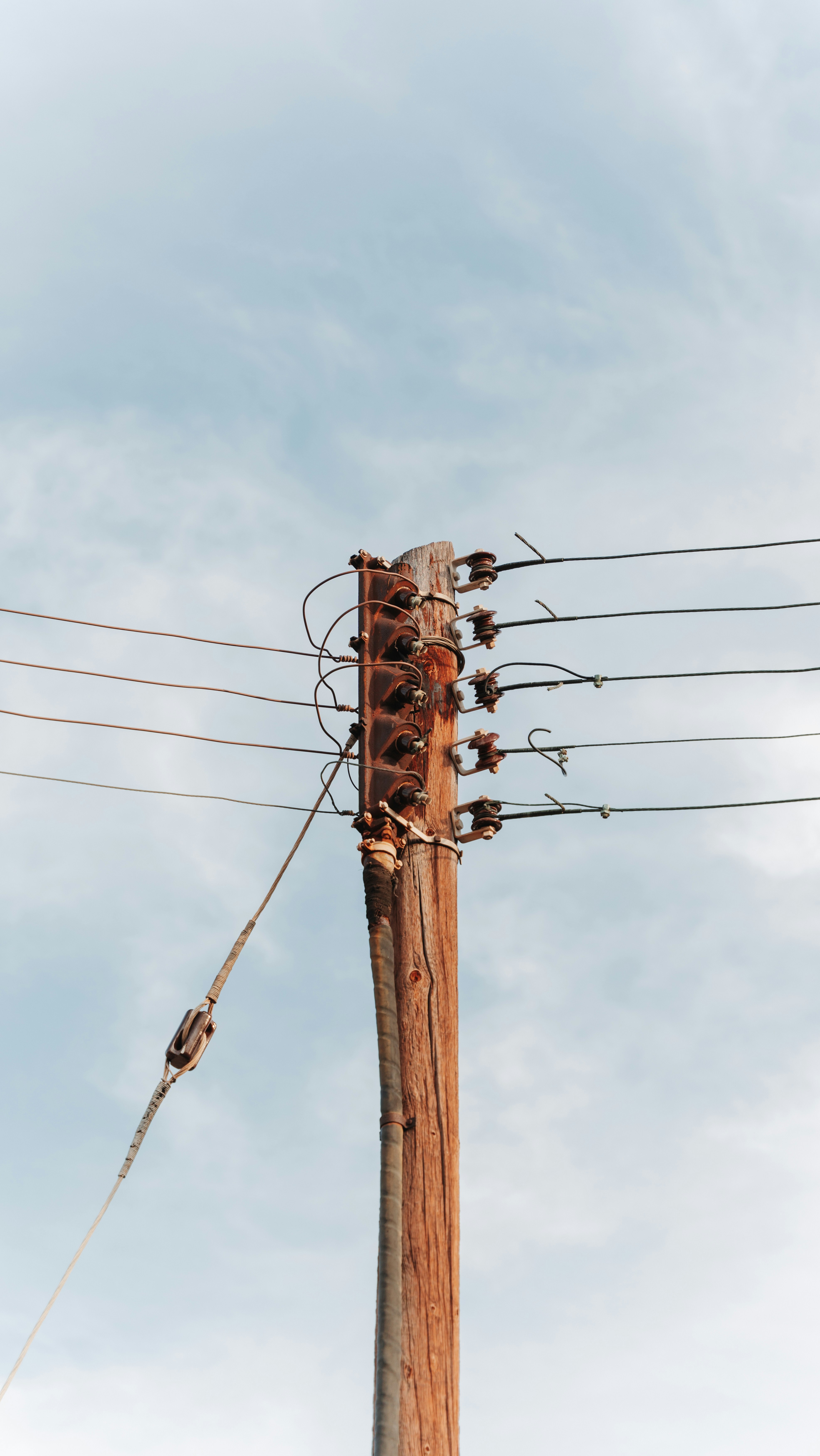 A telephone pole with many wires photo – Free Famagusta Image on Unsplash