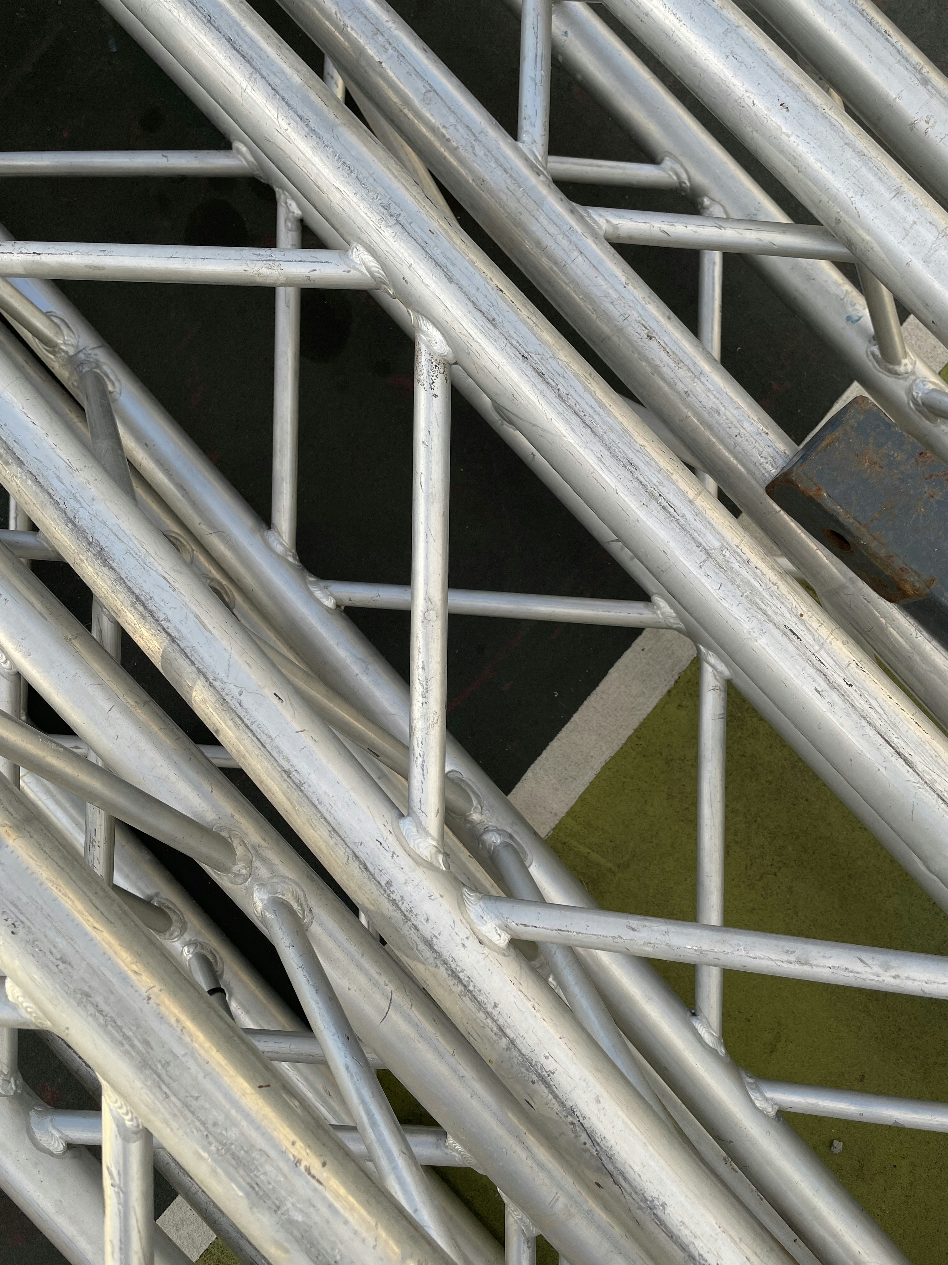 Interlaced Rails: Geometry in a Shimmering Steel Web