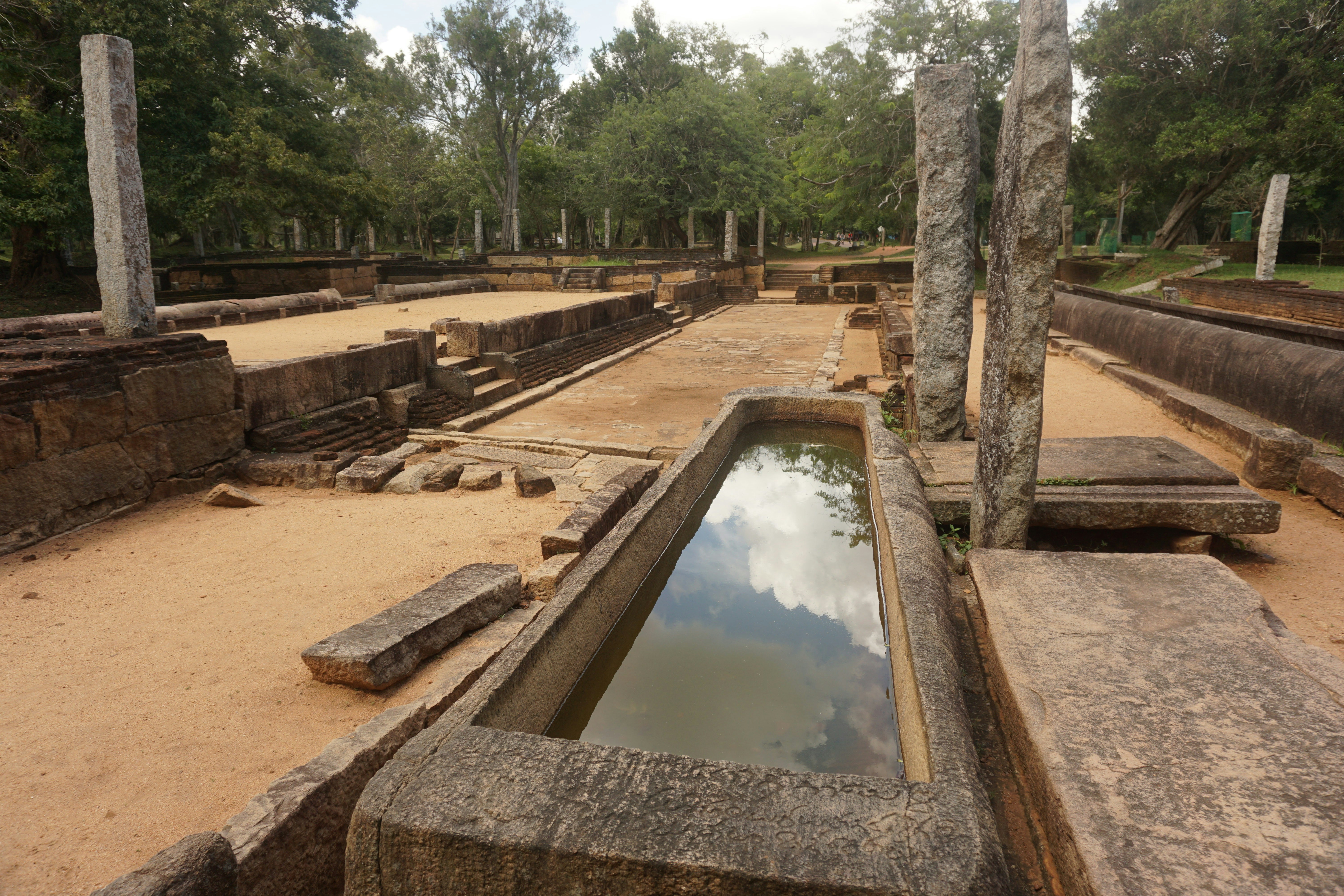 A large circular pool of water photo – Free Ancient city of ...