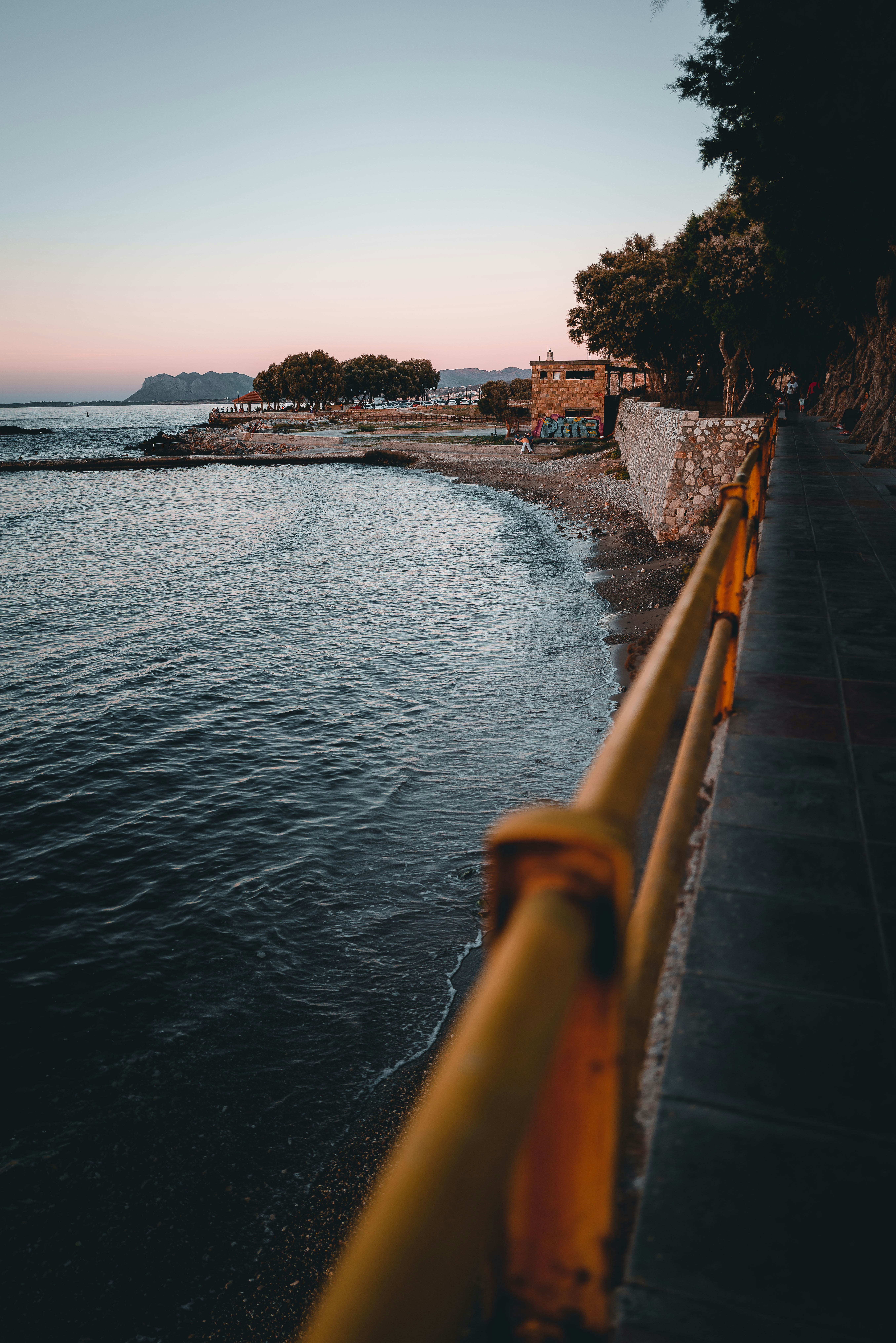 Coastal Promenade: A Sunset Walk Along the Sea Wall