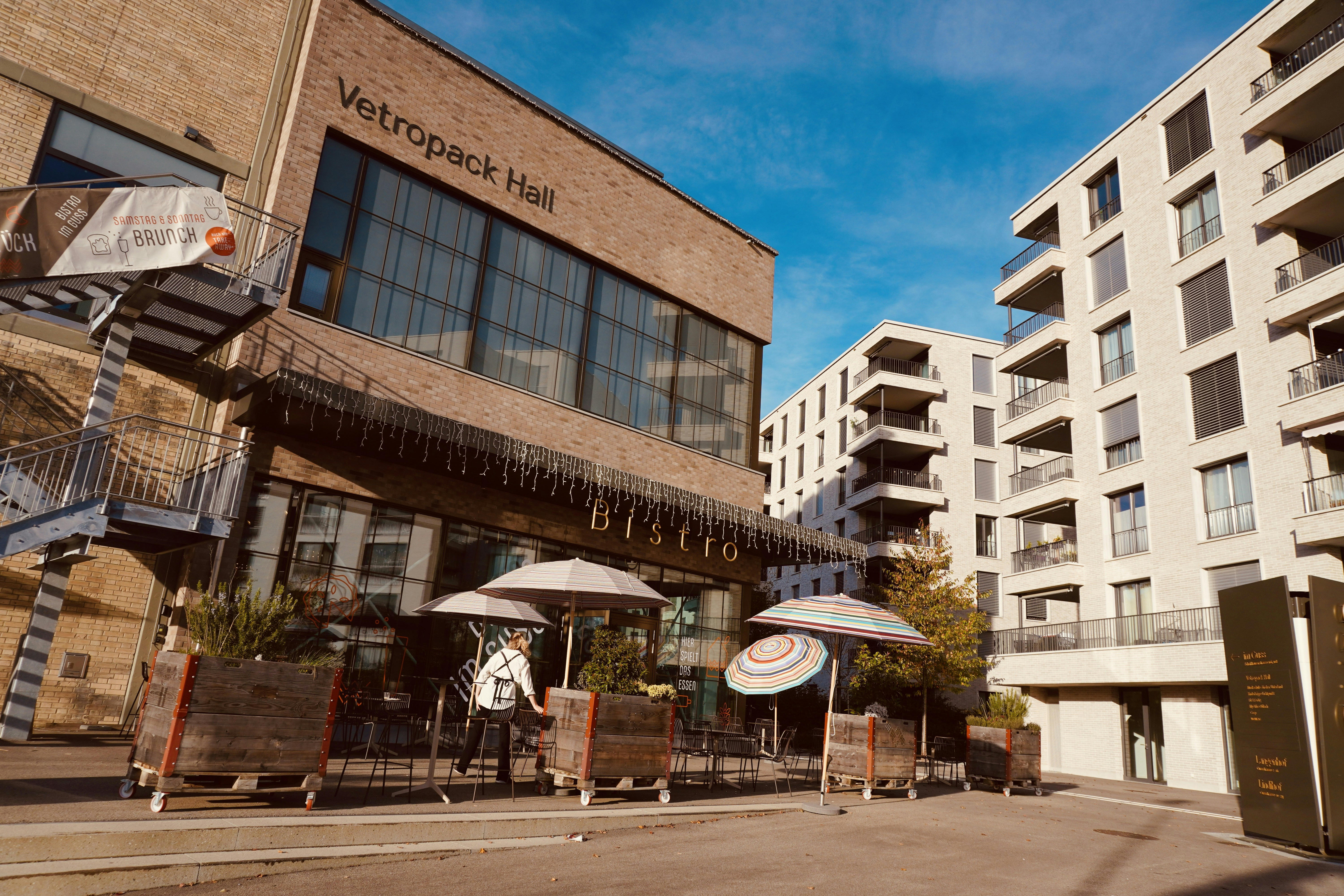 Cafe Terrace at Vetropack: Brick Facade Meets Modern Blocks