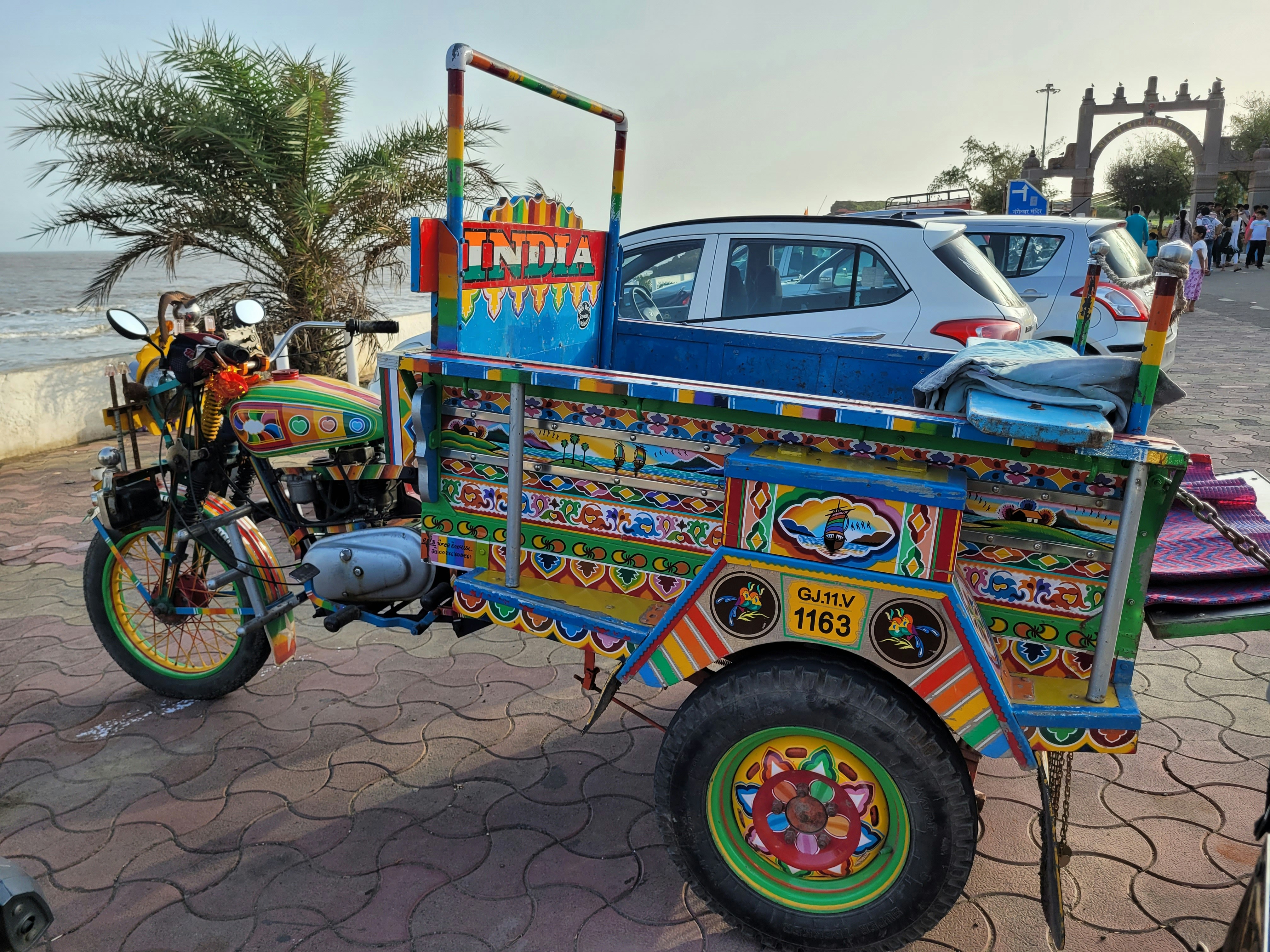 Colorful Indian Rickshaw by the Seafront