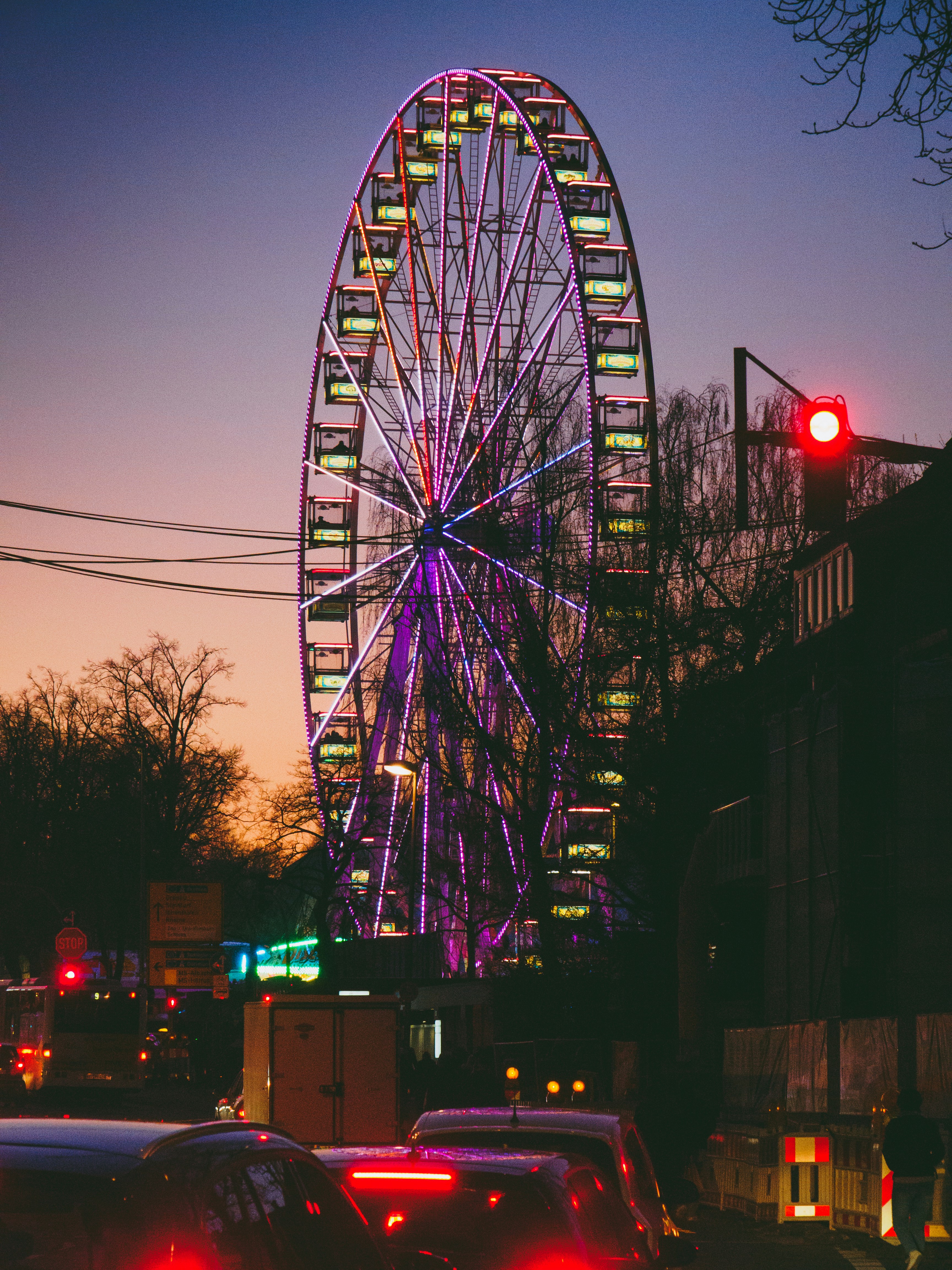Neon Rings Over a Dusk Street