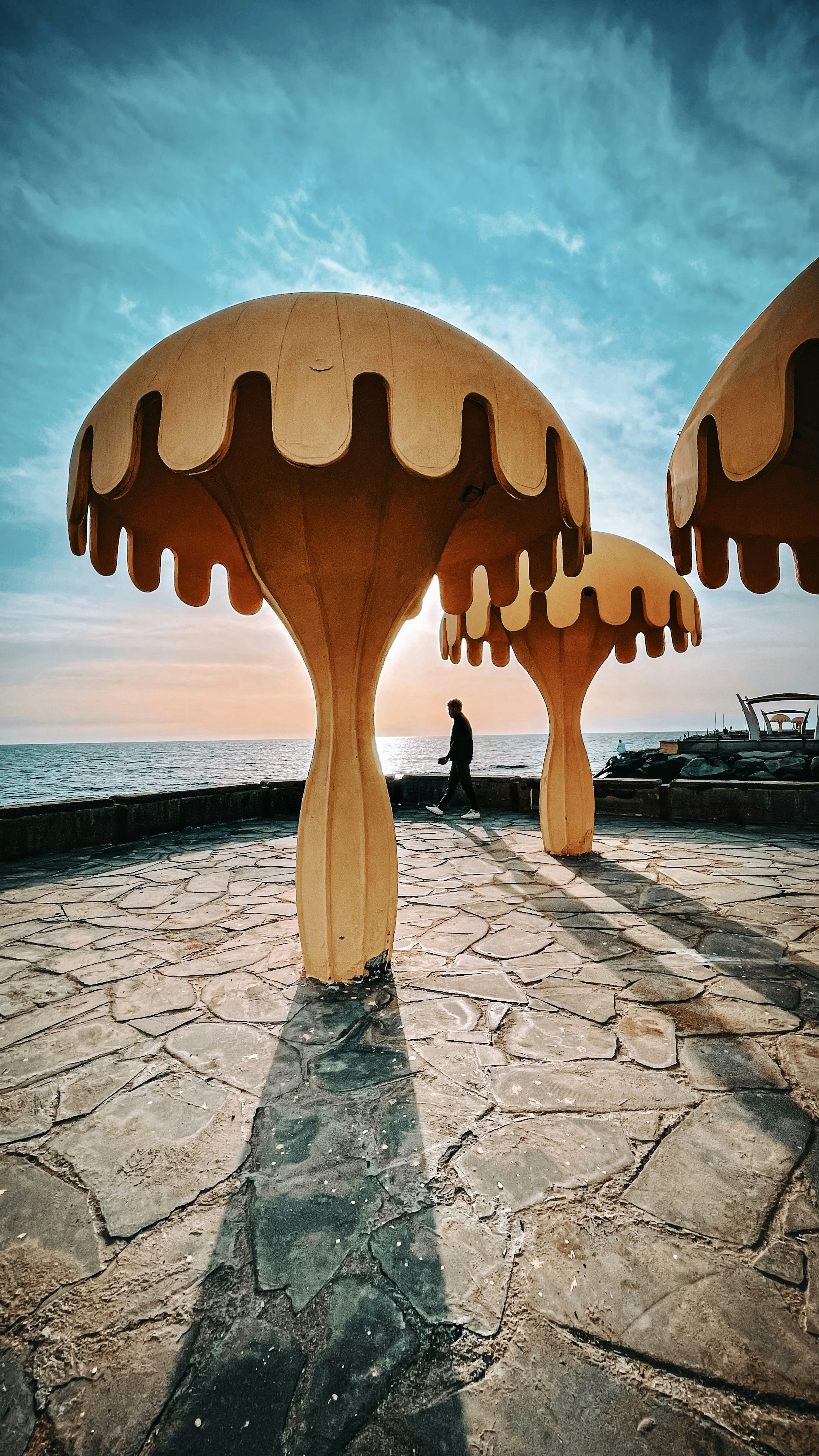 Sunlit Umbrella Guardians by the Sea