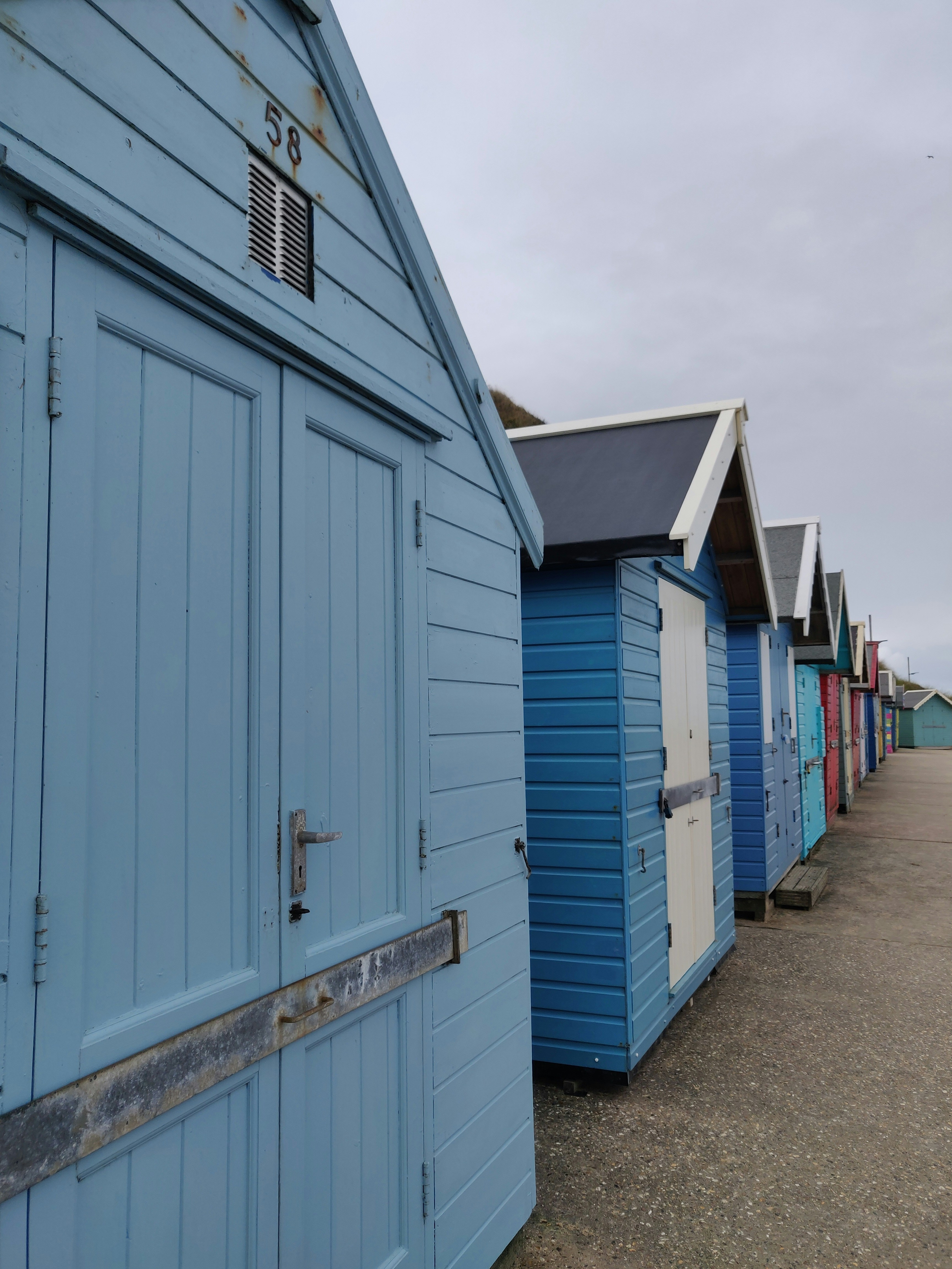 A row of blue sheds photo – Free Building Image on Unsplash