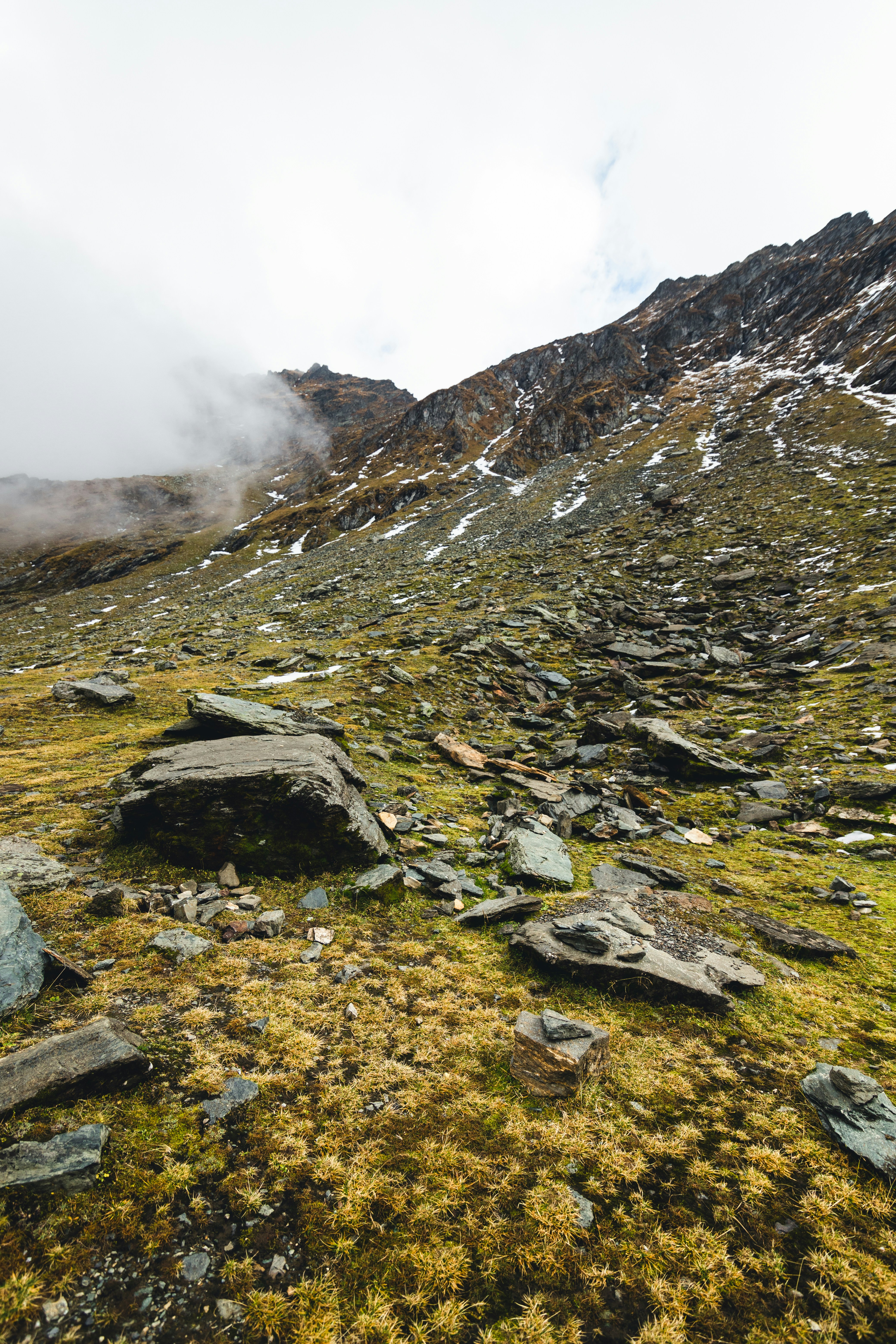 A rocky mountain side photo – Free Nature Image on Unsplash