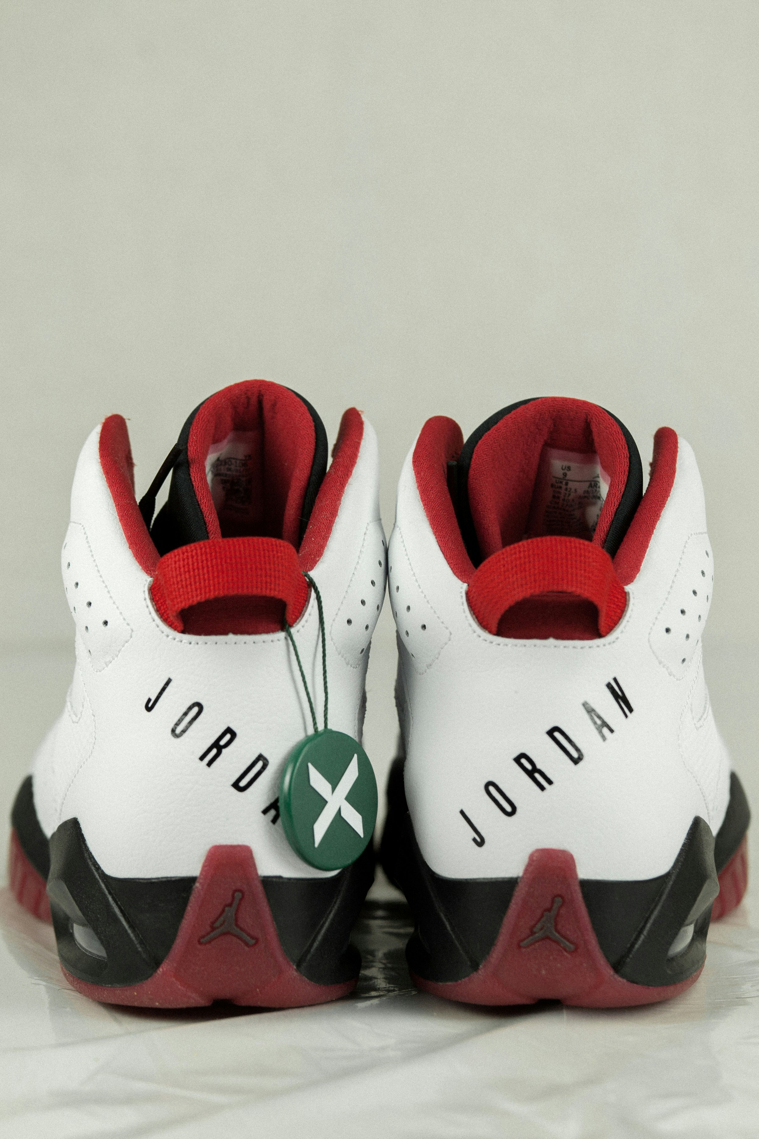 A pair of red and white shoes photo – Free Air jordan 4 Image on Unsplash