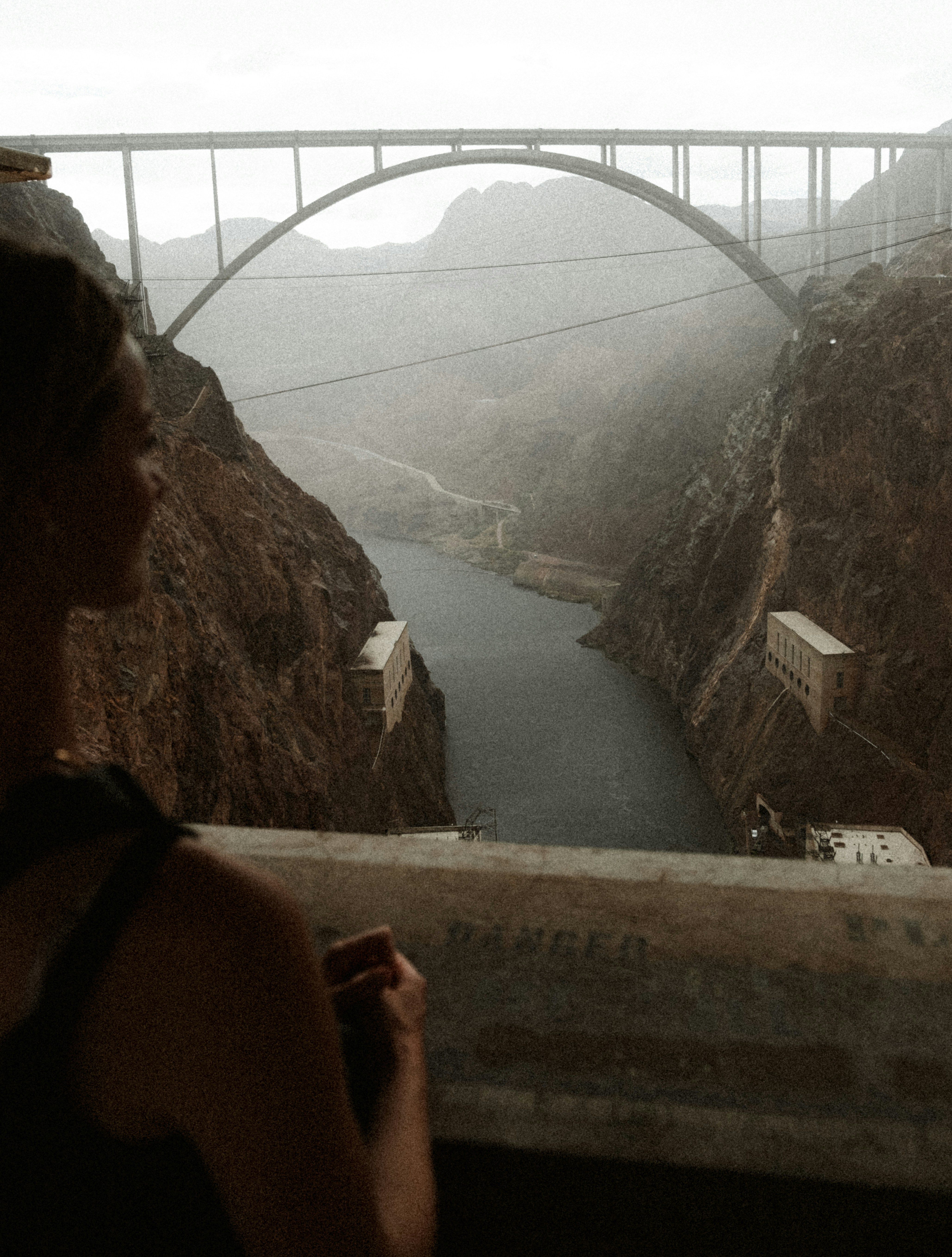 Gaze Over the Gorge: A Suspended Arc Framing a River Cut The Canyon