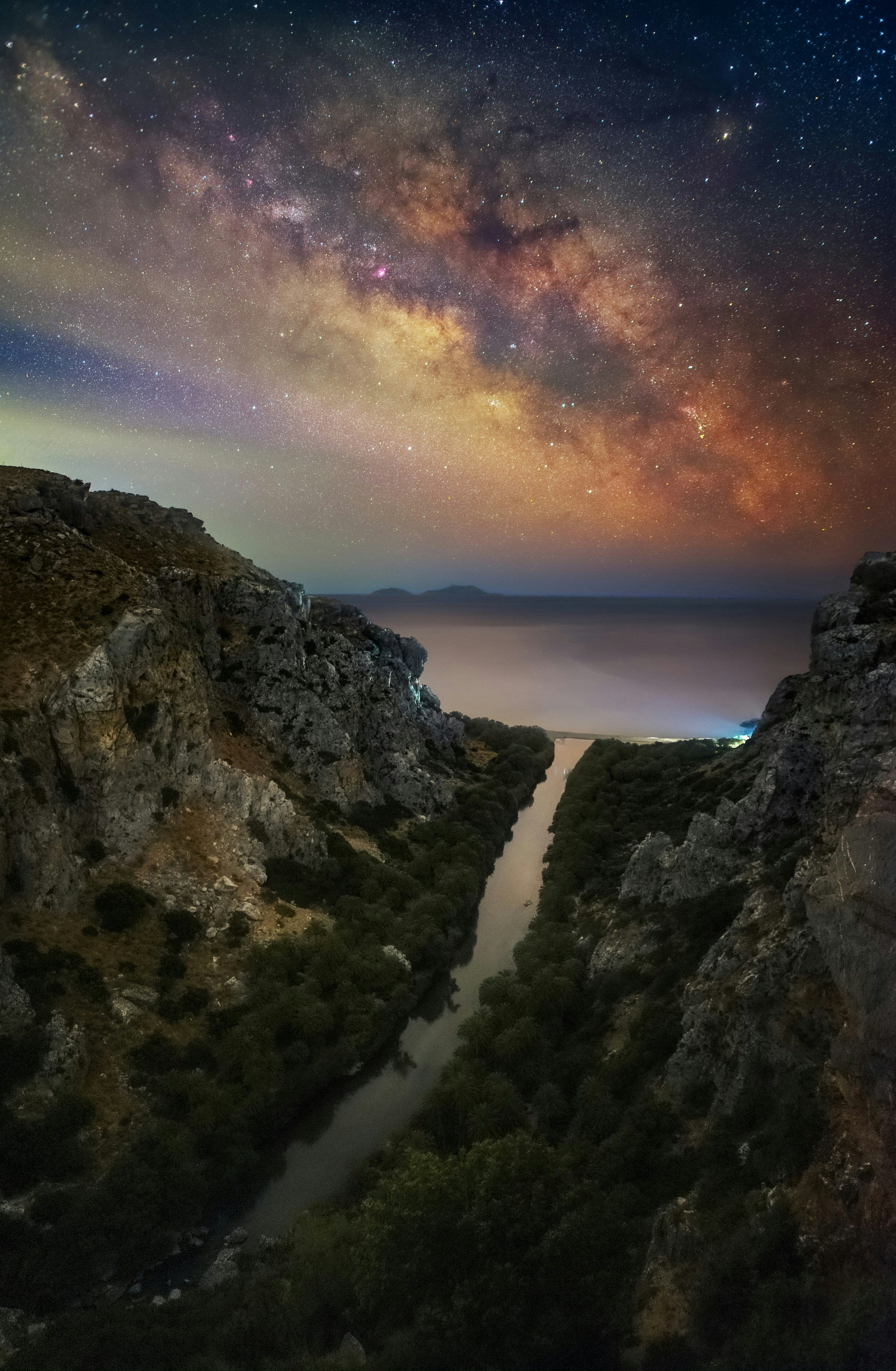 Milky Way Over the Narrow Gorge: A River Winds Toward the Quiet Horizon