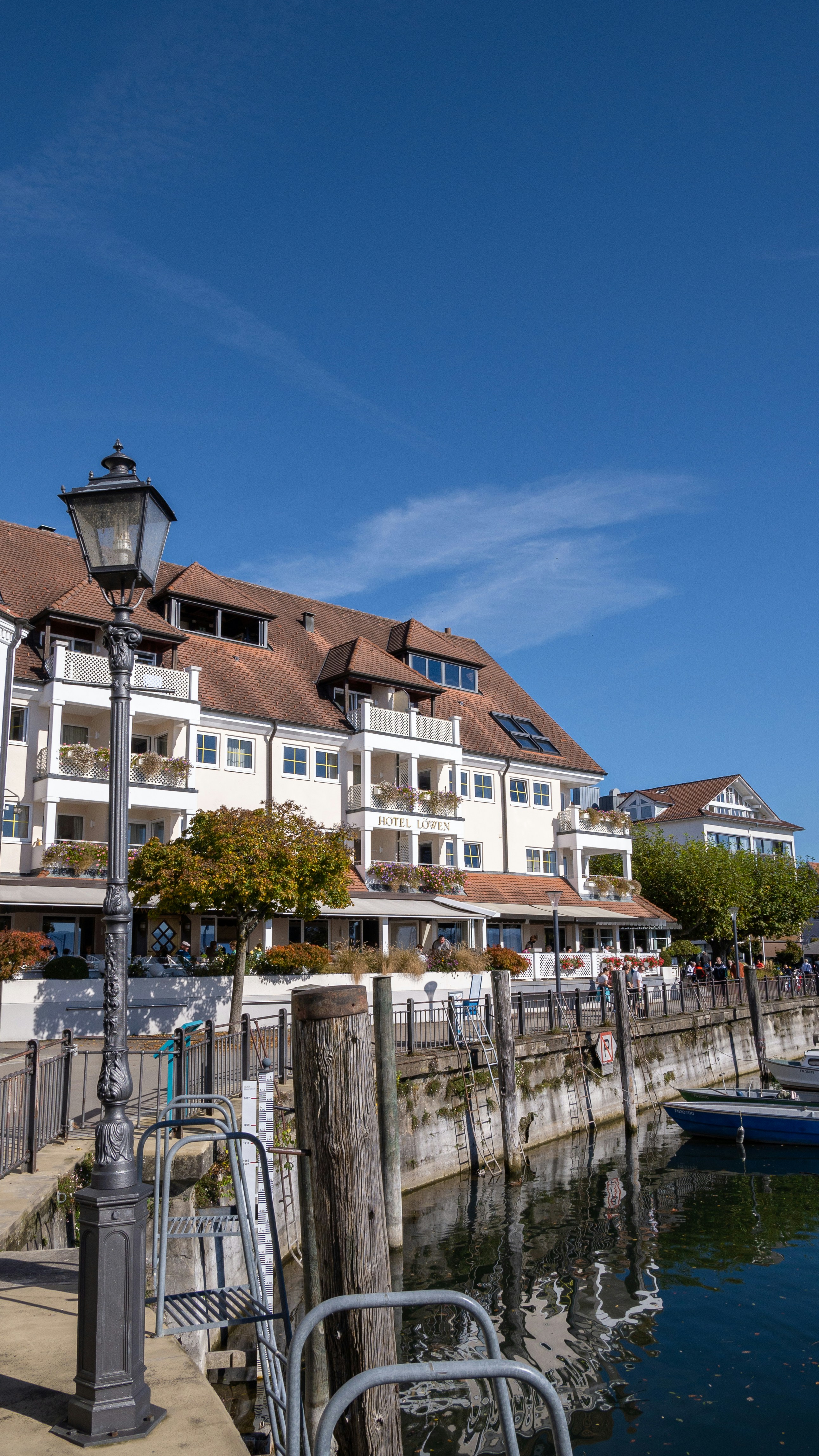 Quayfront Hotel Row Under a Crisp Blue Sky