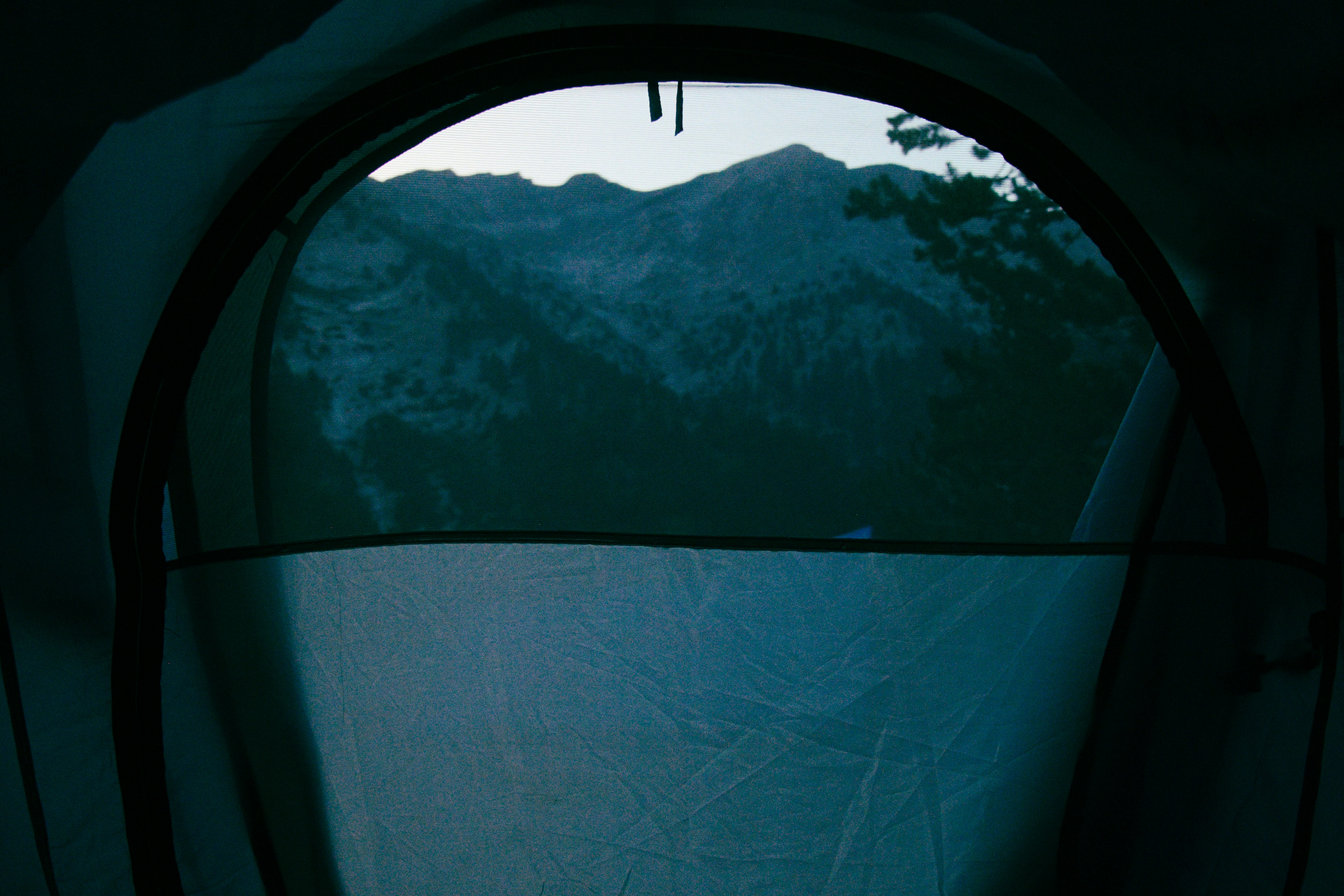 Blue Hour Alpine Vista Framed by a Tent Portal