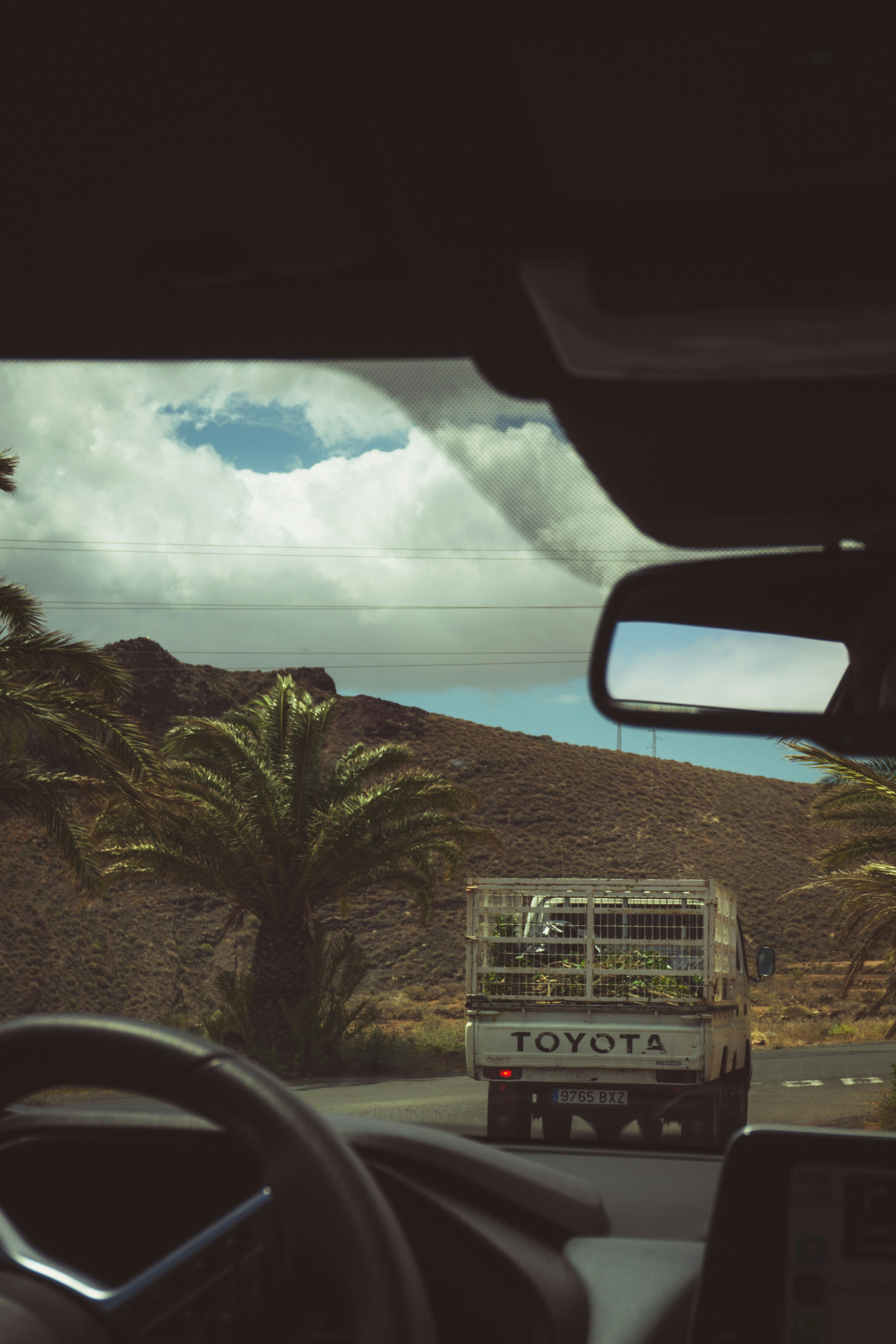 a truck driving down a road