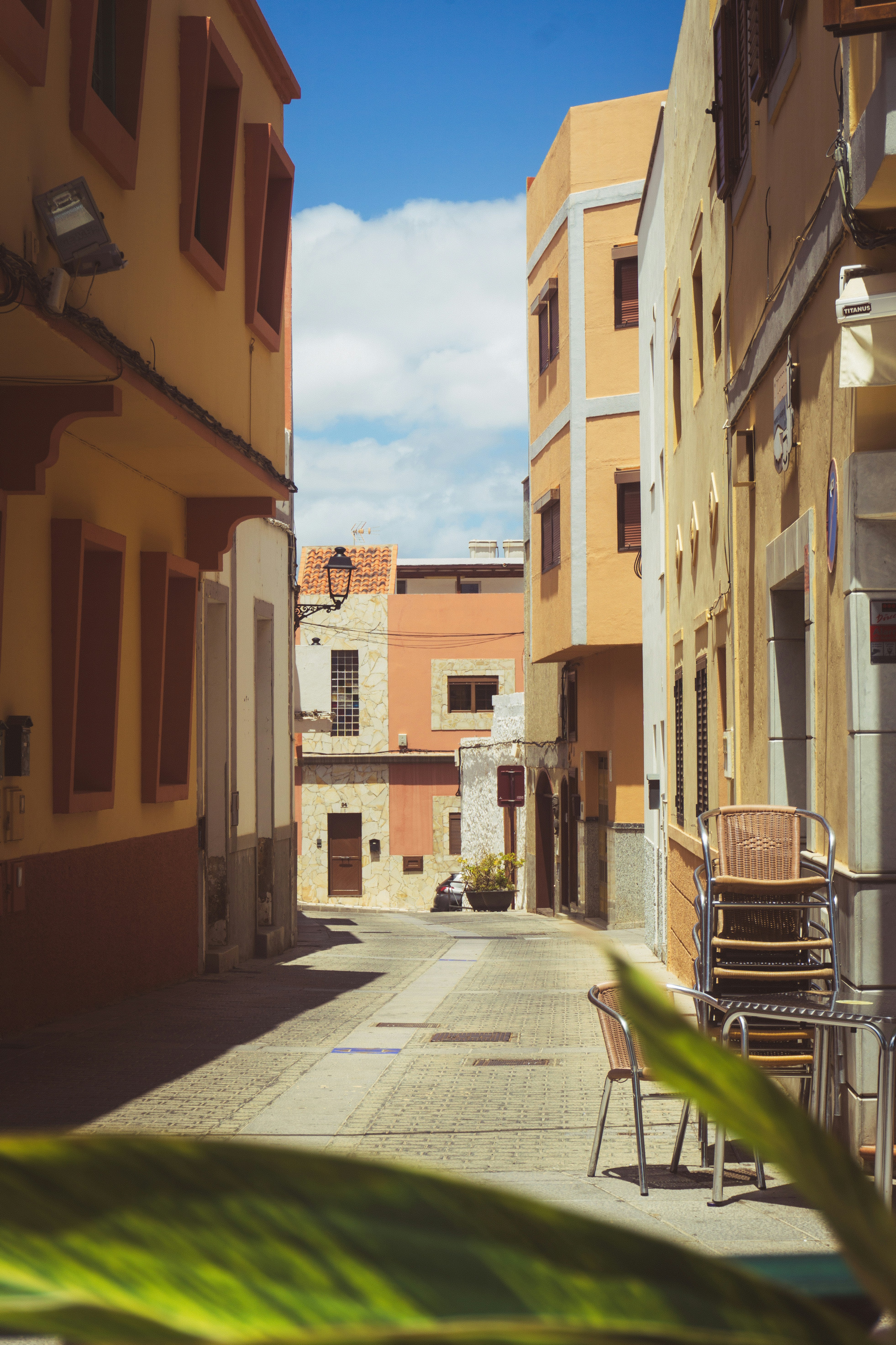 A courtyard between buildings photo – Free Spain Image on Unsplash