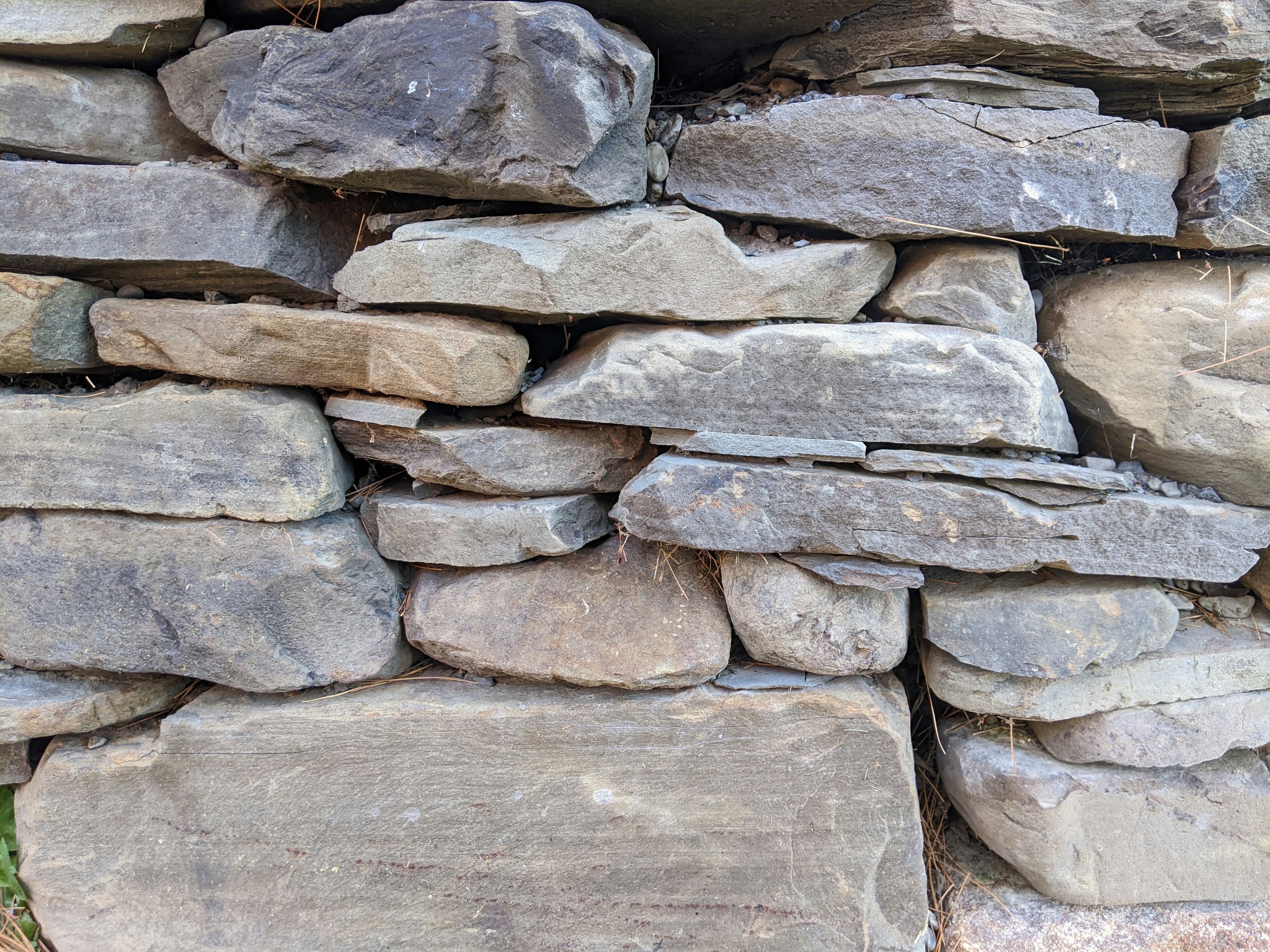 Layered Granite Ledger: A Quiet Stone Wall of Time