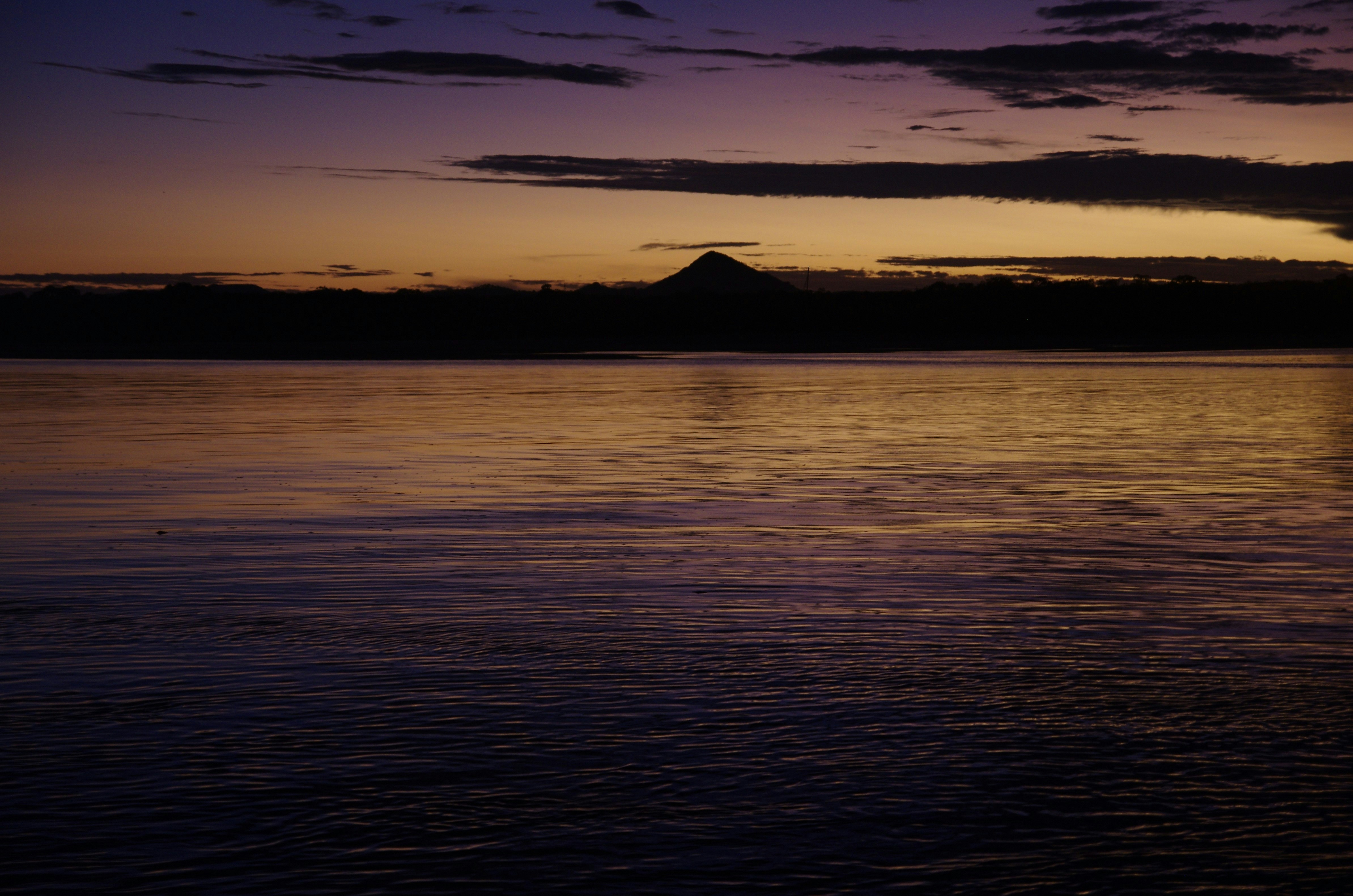Silhouette at Dusk: A Quiet Horizon over Quiet Water