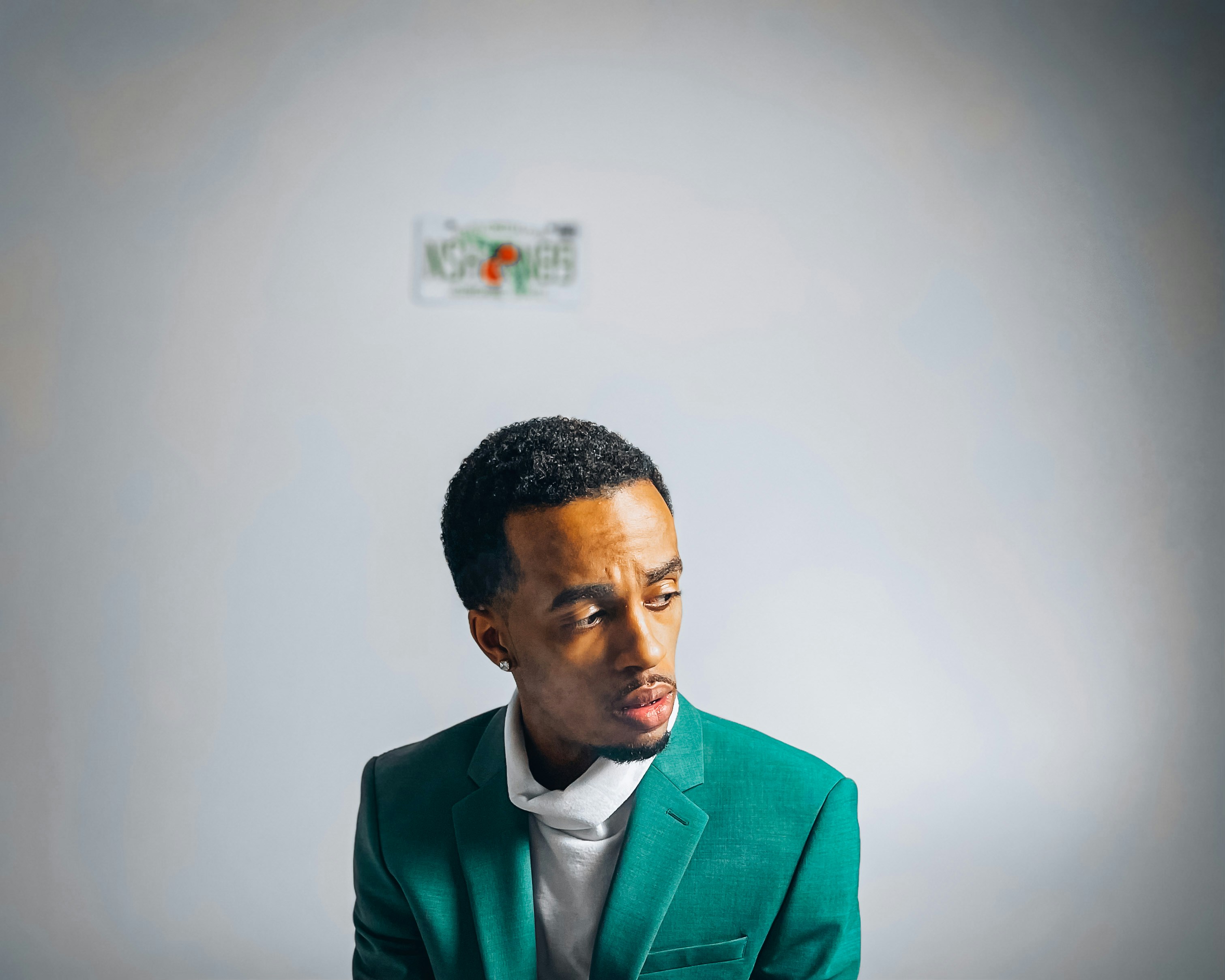 Teal Focus: A Studio Portrait of Quiet Intensity