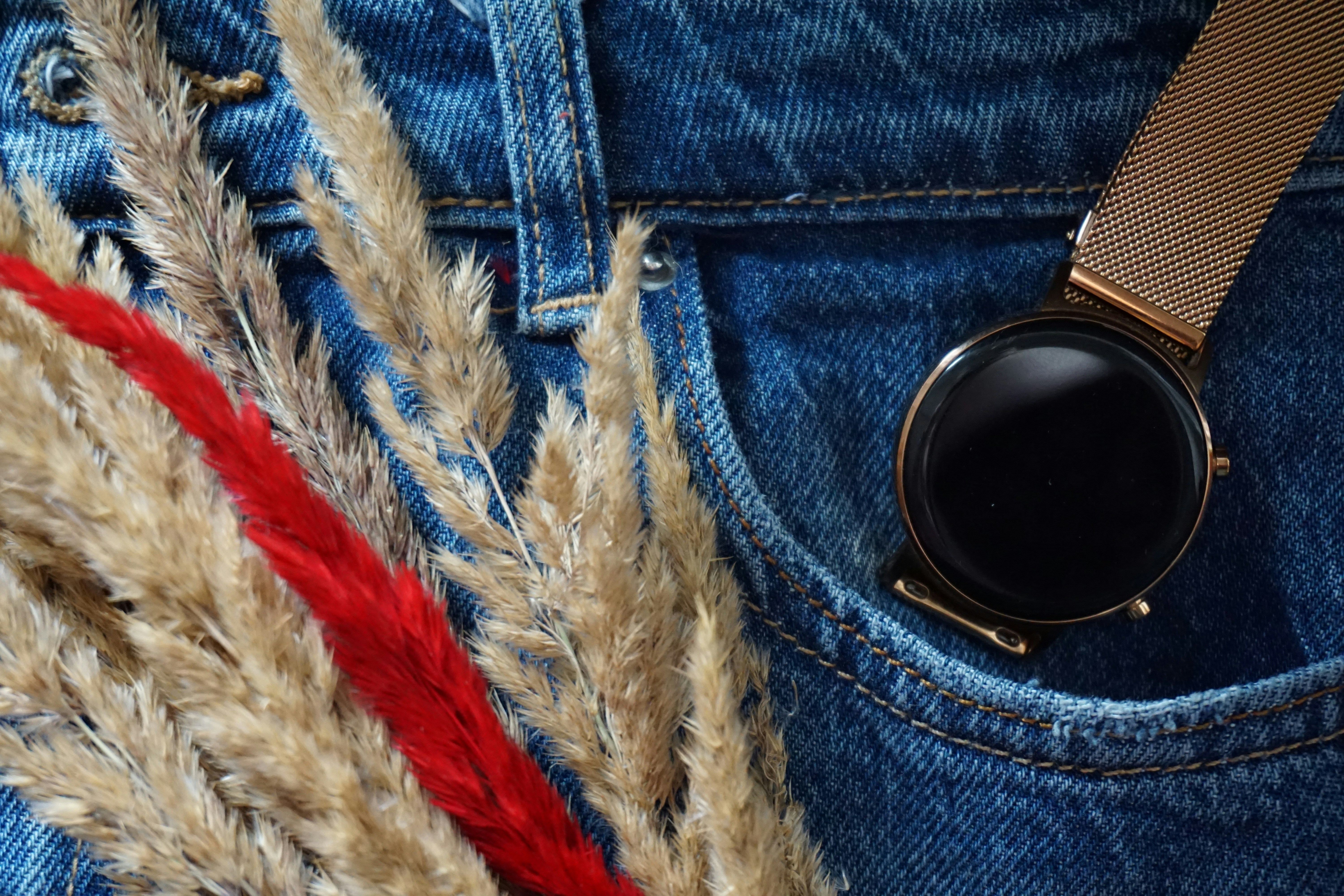 a close-up of a person's jeans and a pair of jeans